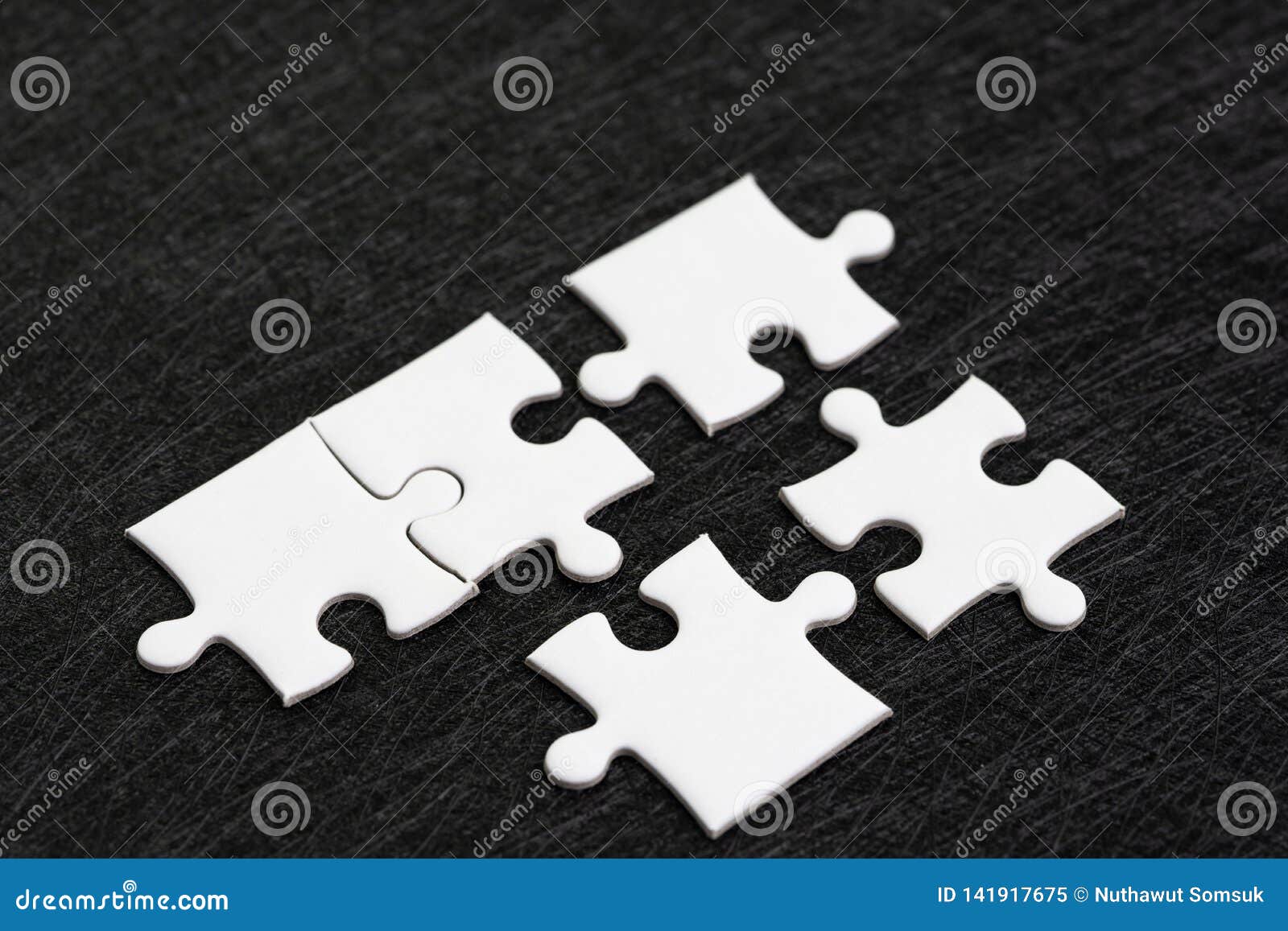 Closed Up of White Jigsaw Puzzle on Dark Black Background Using As ...