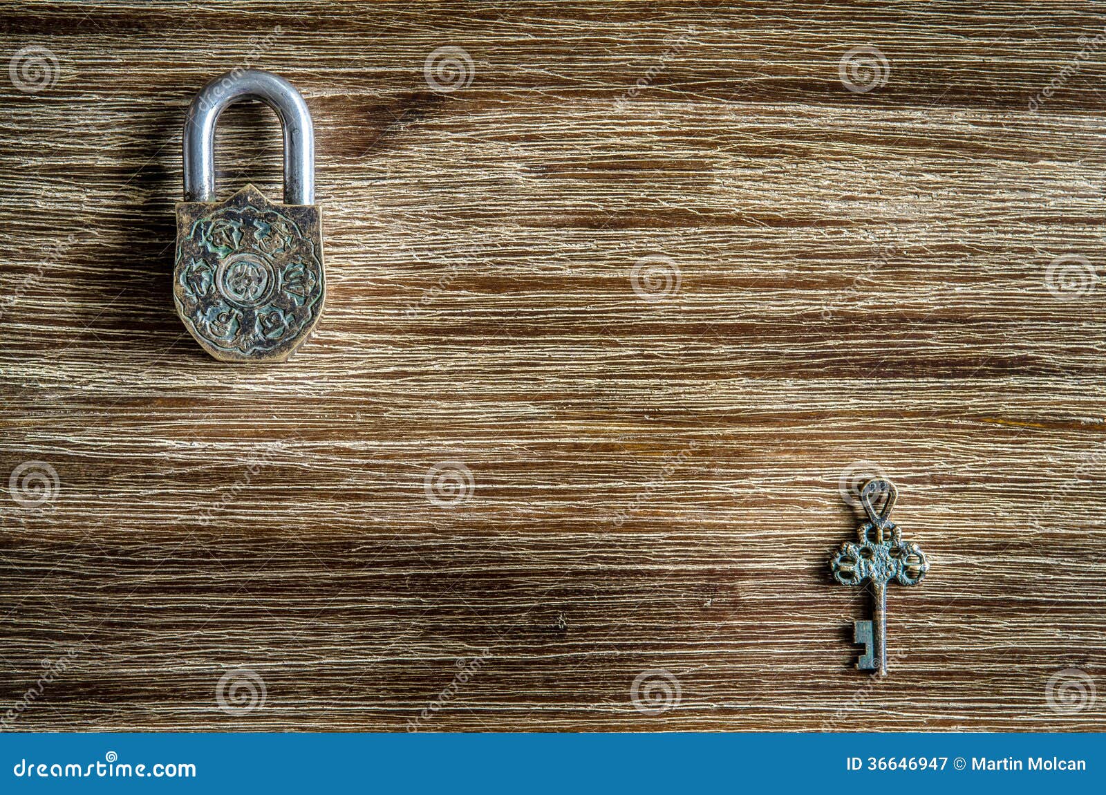 Closed Vintage Padlock and Key on a Wooden Texture Stock Image - Image ...