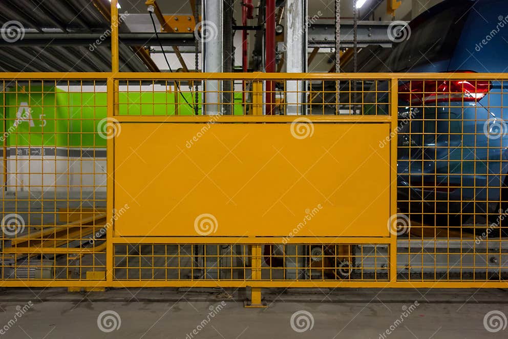 Closed Yellow Gate in a Parking Area Stock Photo - Image of closed ...