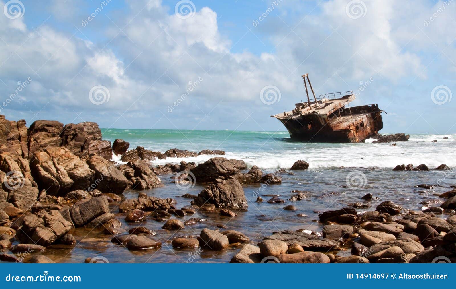 ClosedAghullas Shipwreck Lying on the Rocks Stock Image - Image of ...