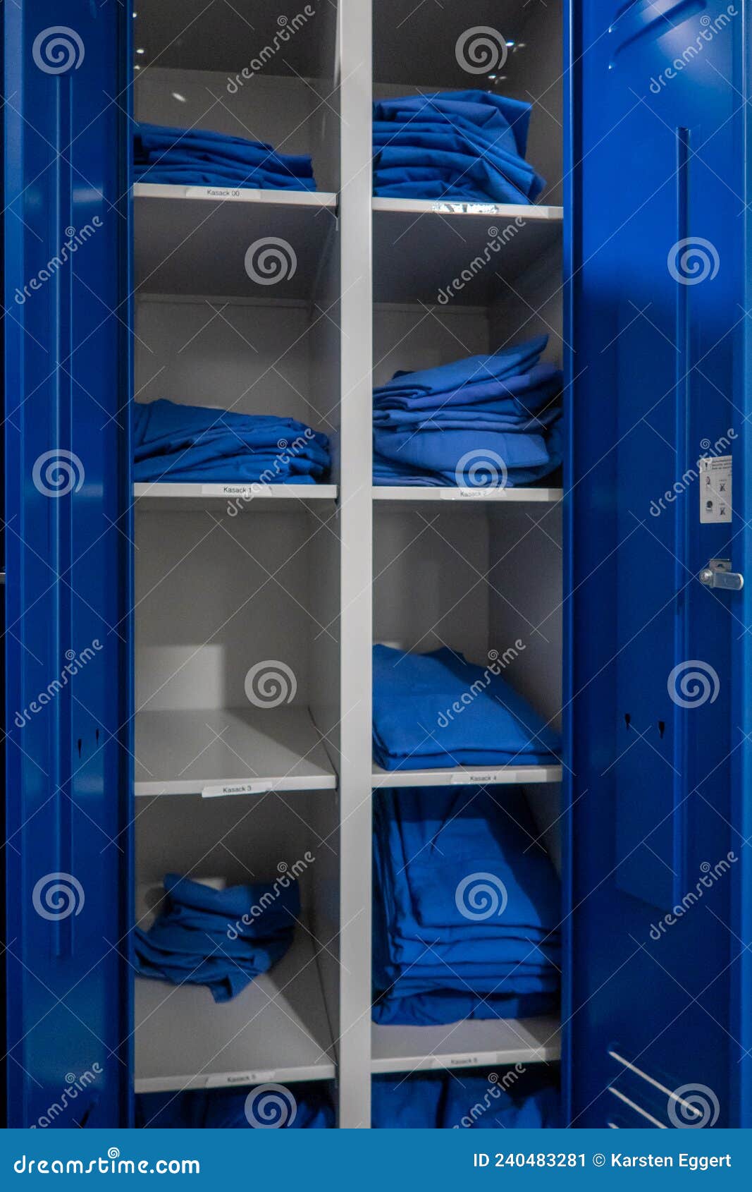 In a Closet is Blue Hospital Clothes in Different Sizes Stock Image ...