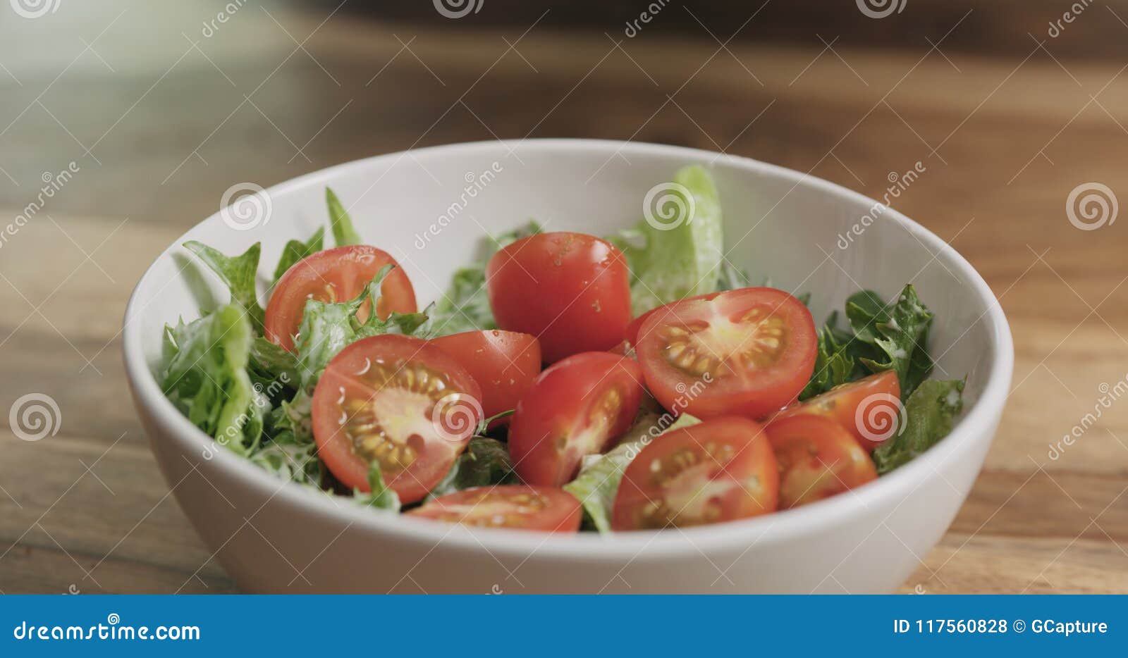 Closeup Adding Tomatoes To Caesar Salad Stock Photo - Image of green ...