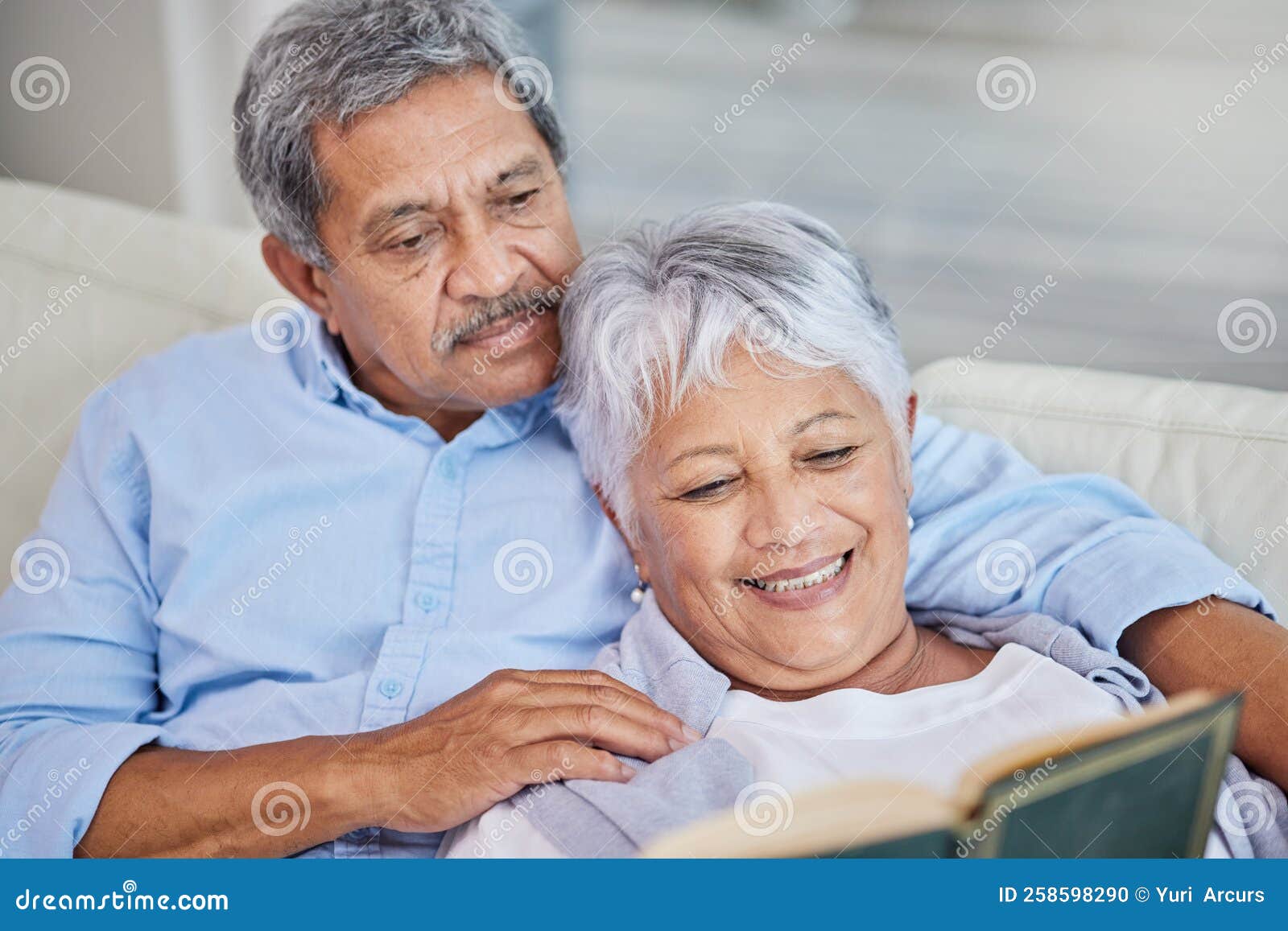 Closeup Of An Affectionate Mixed Race Senior Couple Relaxing And