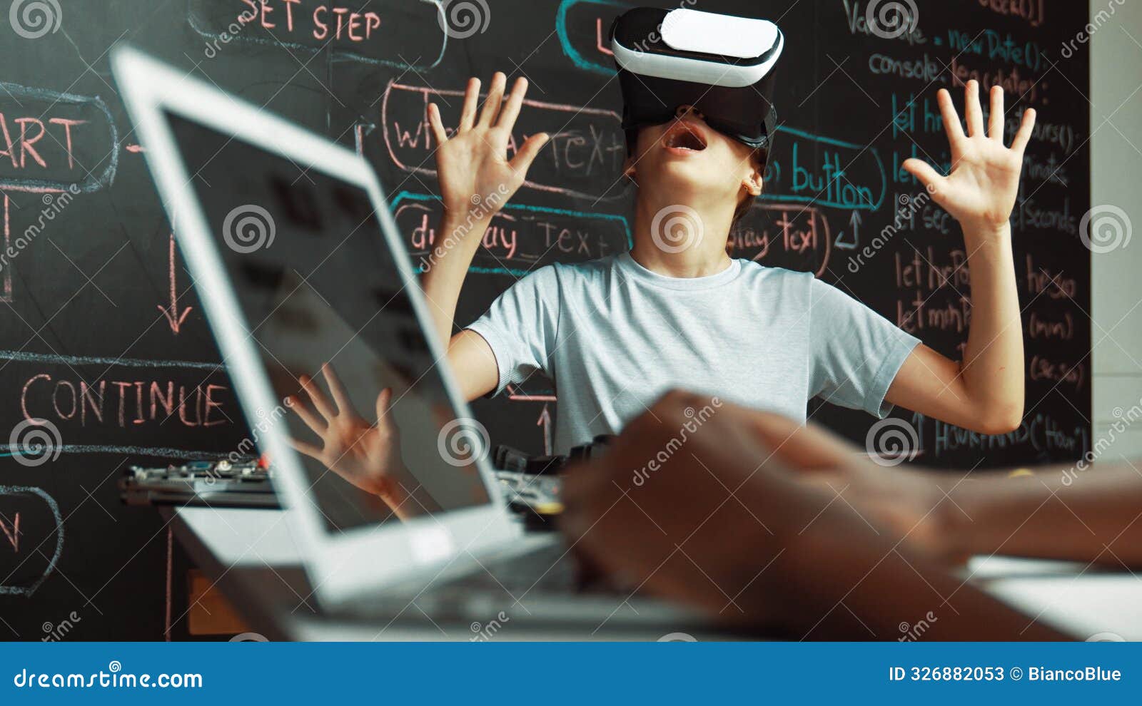 Closeup of African Student Hands Programing System at Blackboard ...