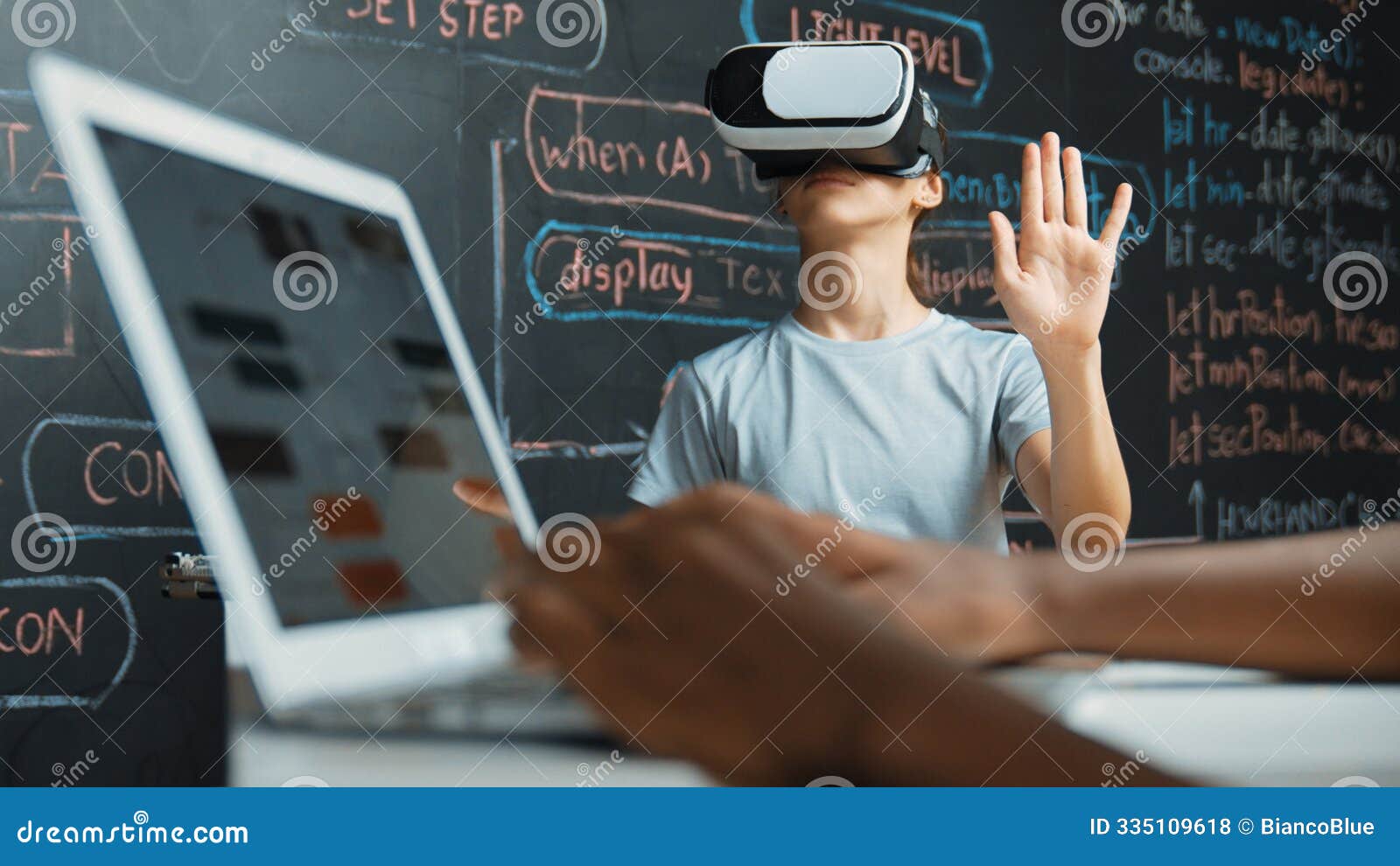 Closeup of African Student Hands Programing System at Blackboard ...