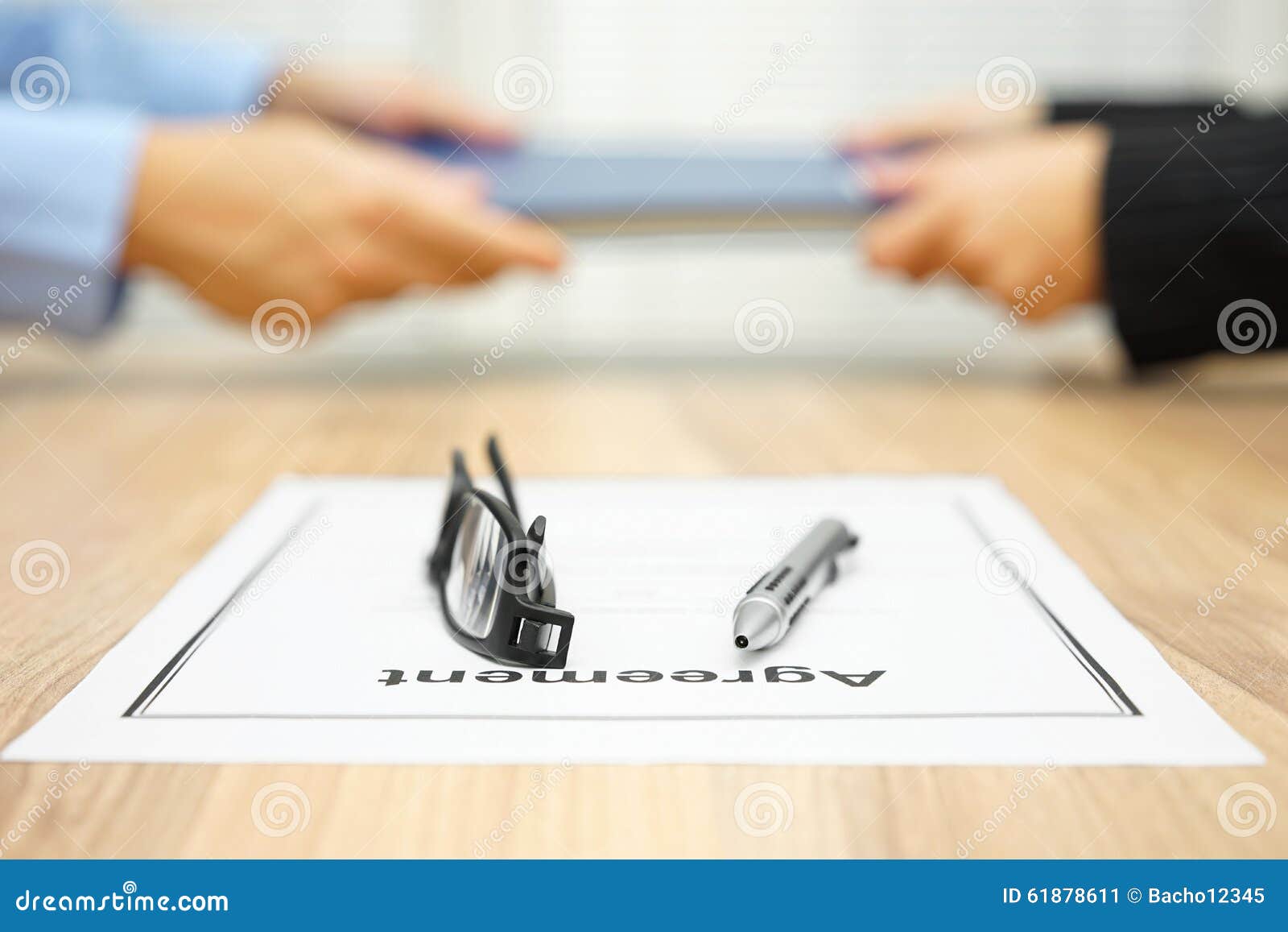 Closeup of Agreement Document with Businesswoman Passing Folder Stock ...