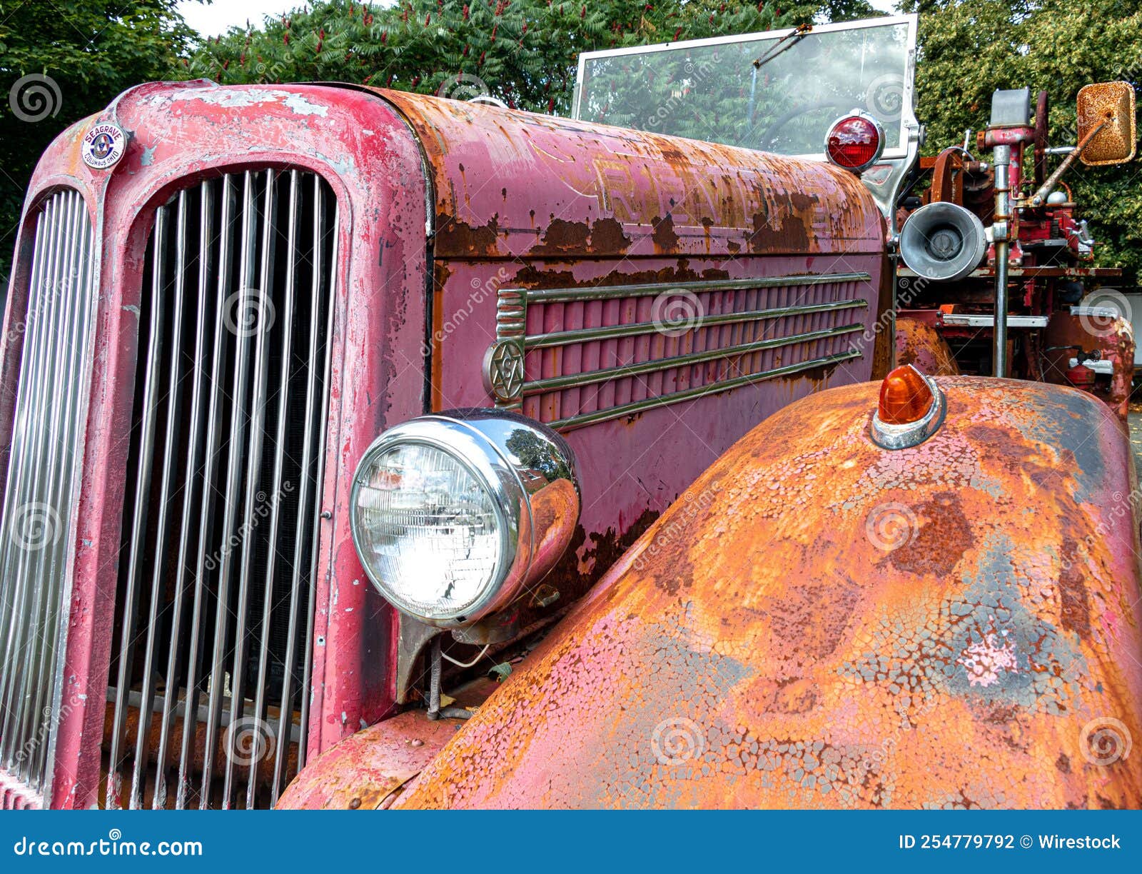 Closeup of an Antique Rusty Fire Engine Truck Transport on the Streets ...