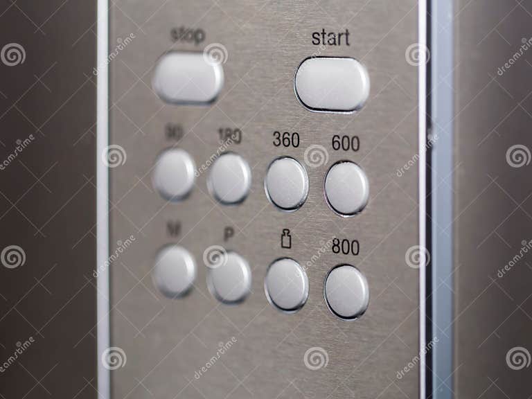 Closeup of an Appliance Control Panel Buttons on a Metal Surface Stock ...