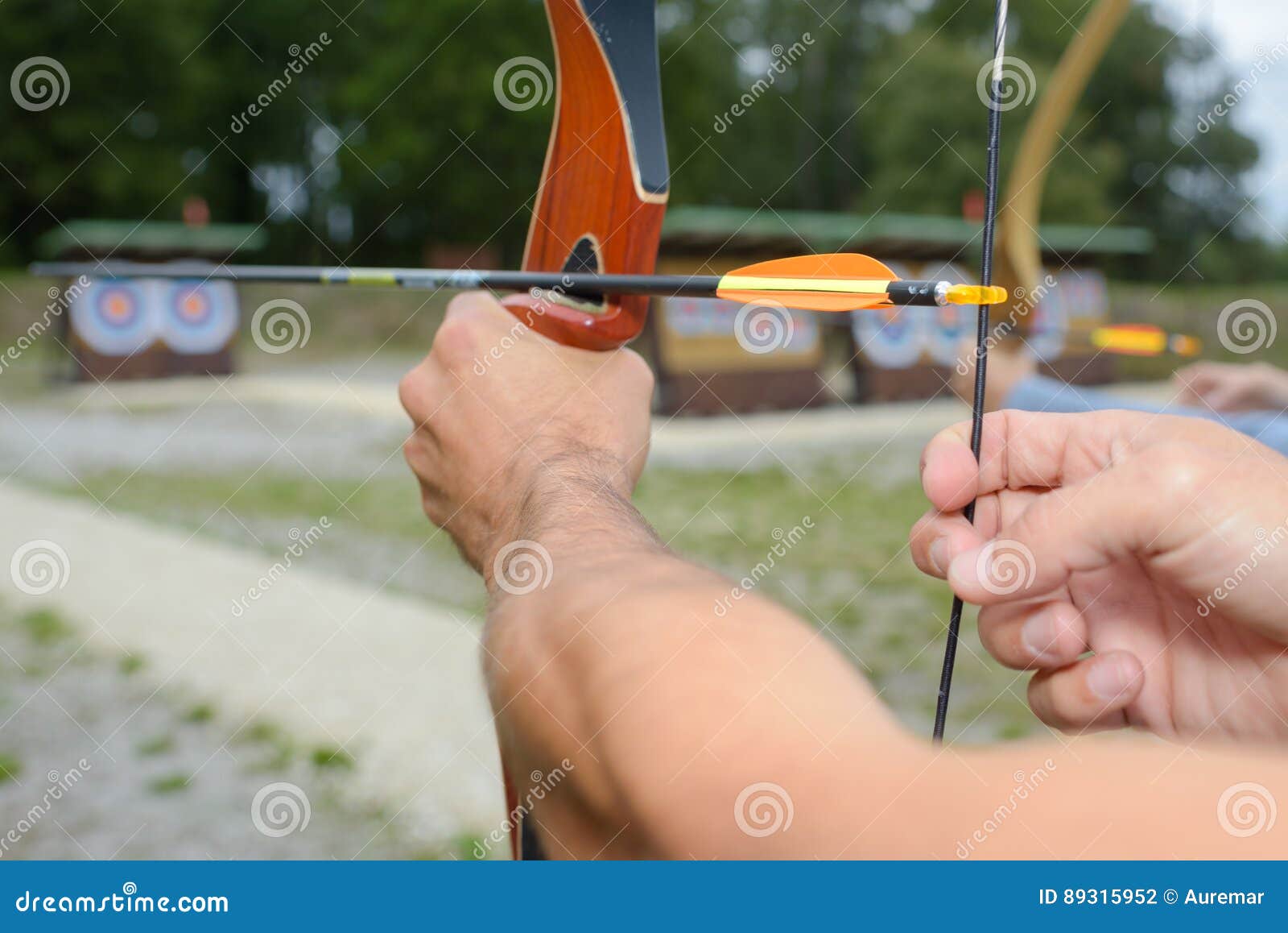 Closeup Arrow Being Pulled on Bow Stock Photo - Image of fletch ...