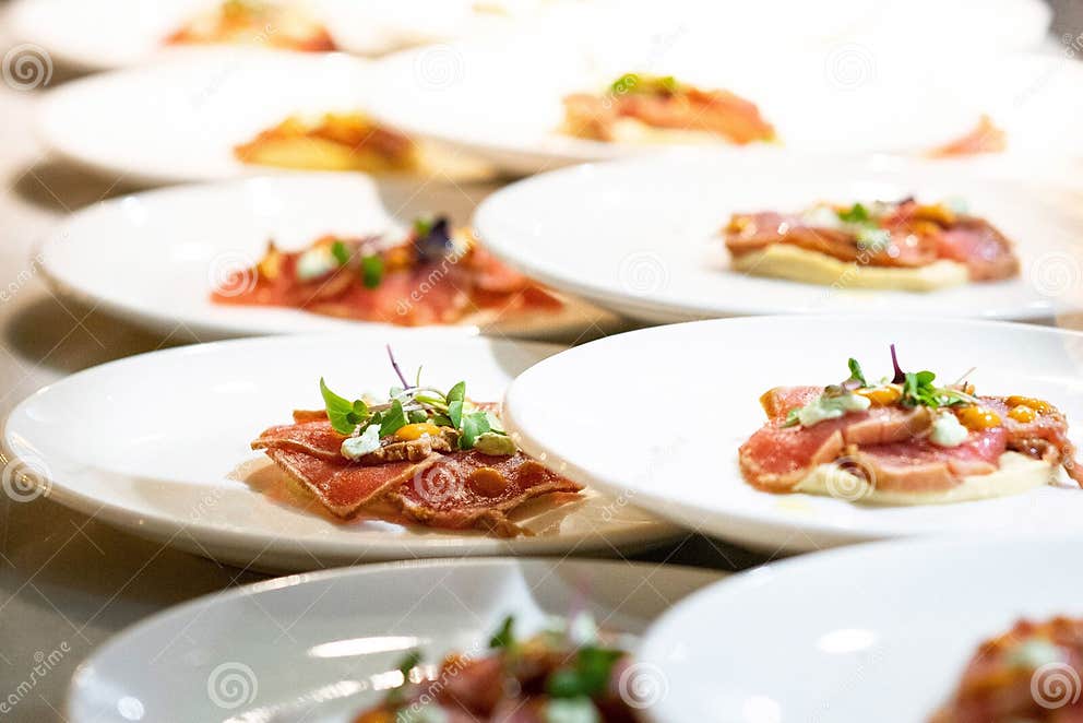 Closeup of Assorted Appetizers Arranged on Plates Stock Photo - Image ...