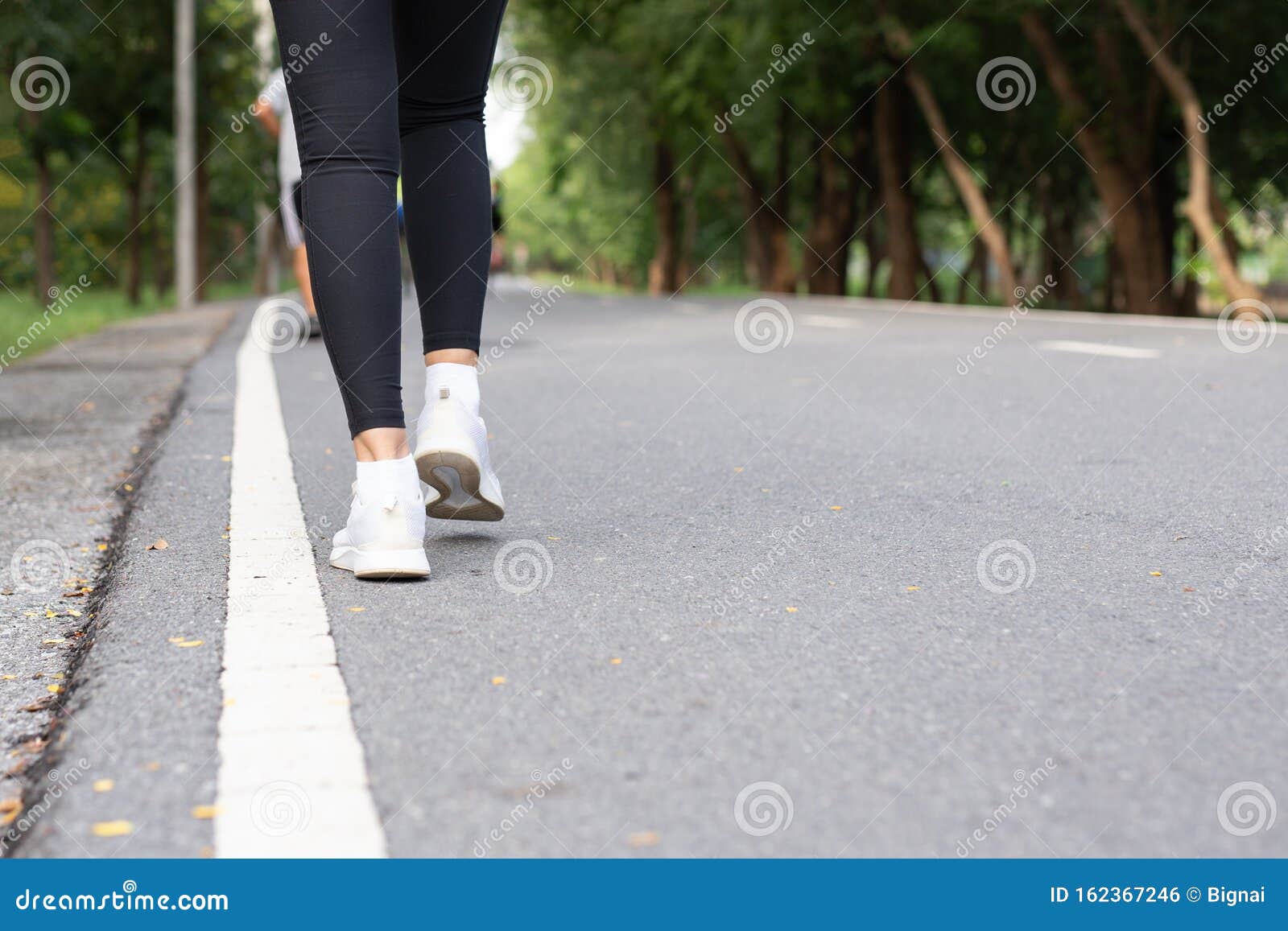 Closeup Athletes Sneakers Exercise Walking on Foot Path in the Morning ...