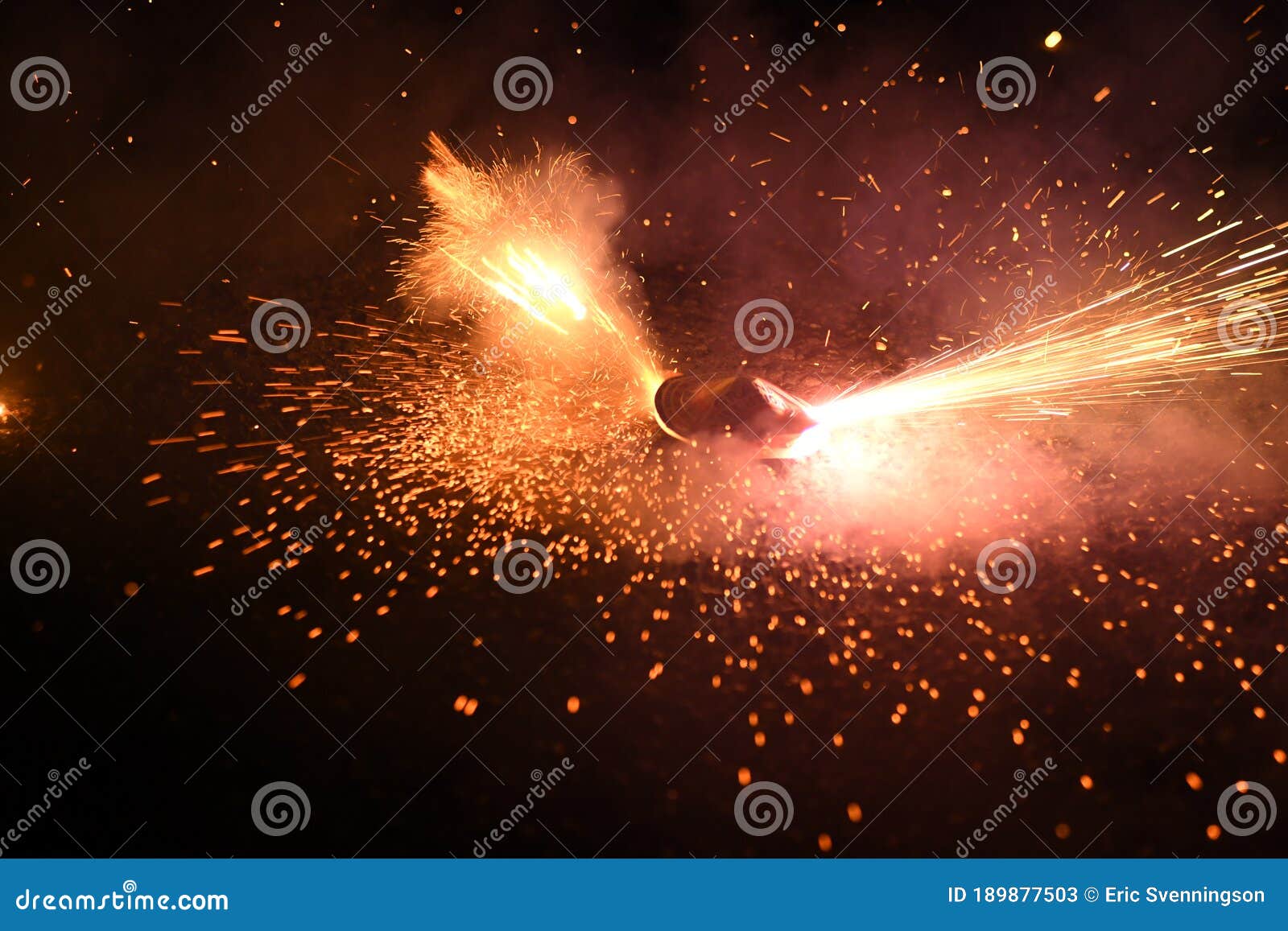 A Closeup of an Awesome Firework As it Explodes and Streams Sparks ...
