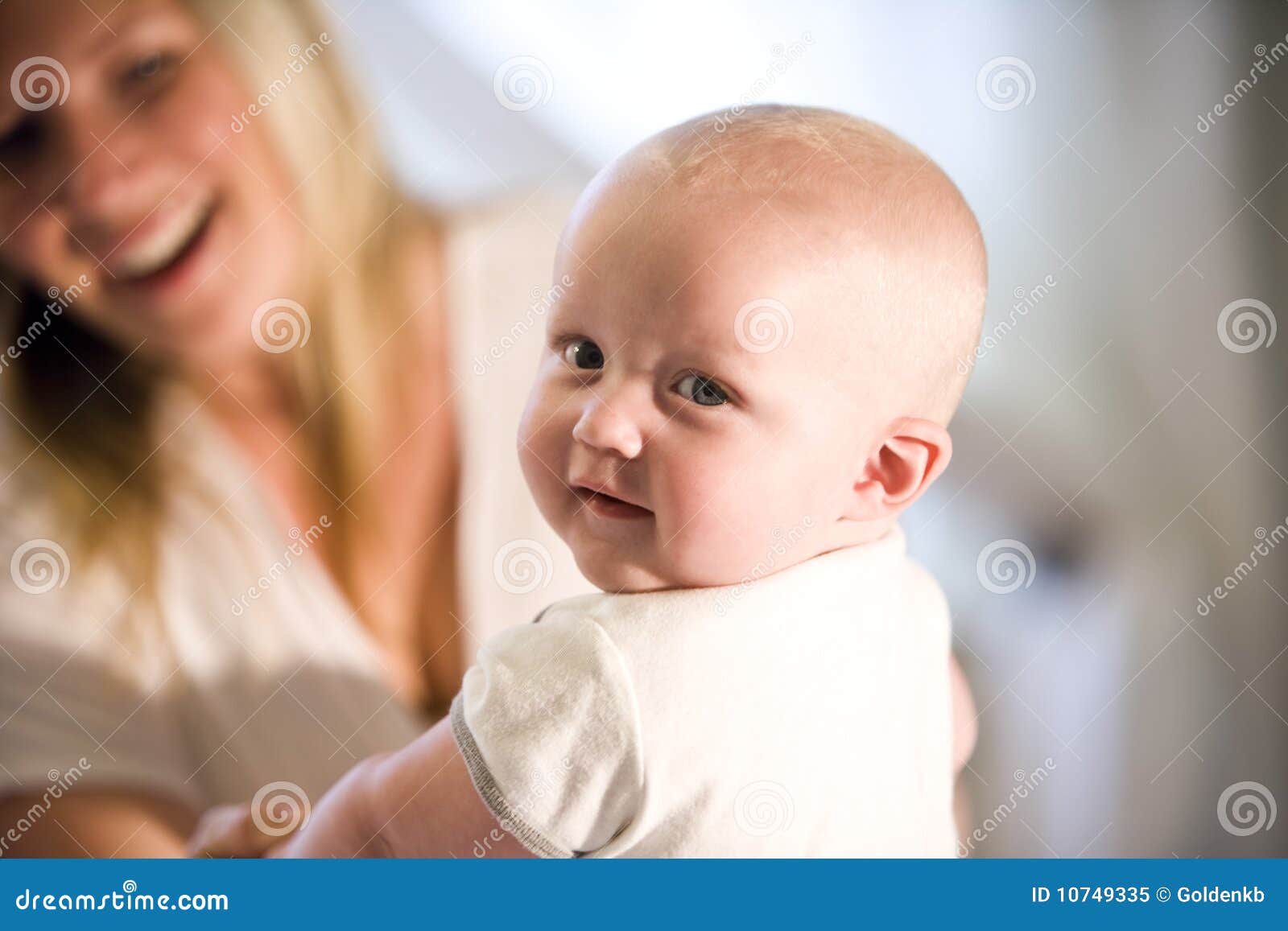 Closeup of Baby Looking Over His Shoulder Stock Image - Image of bald ...