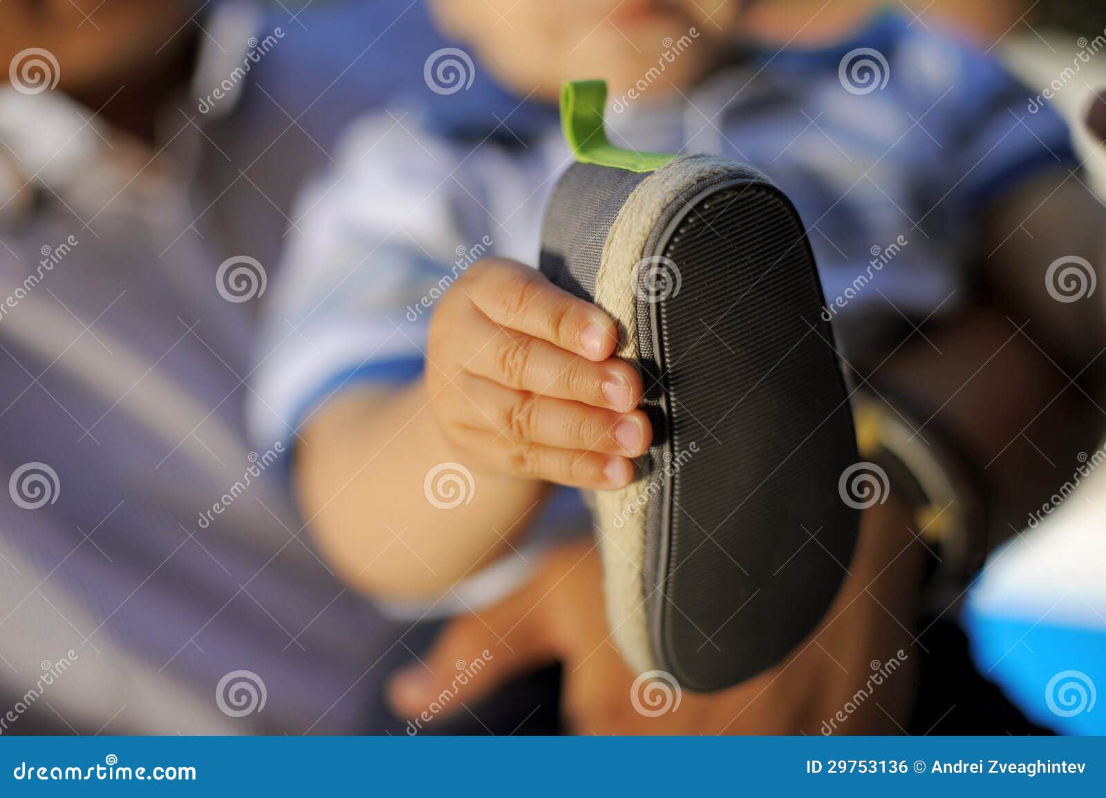 Boot in Baby s Hand stock photo. Image of helping, high - 29753136