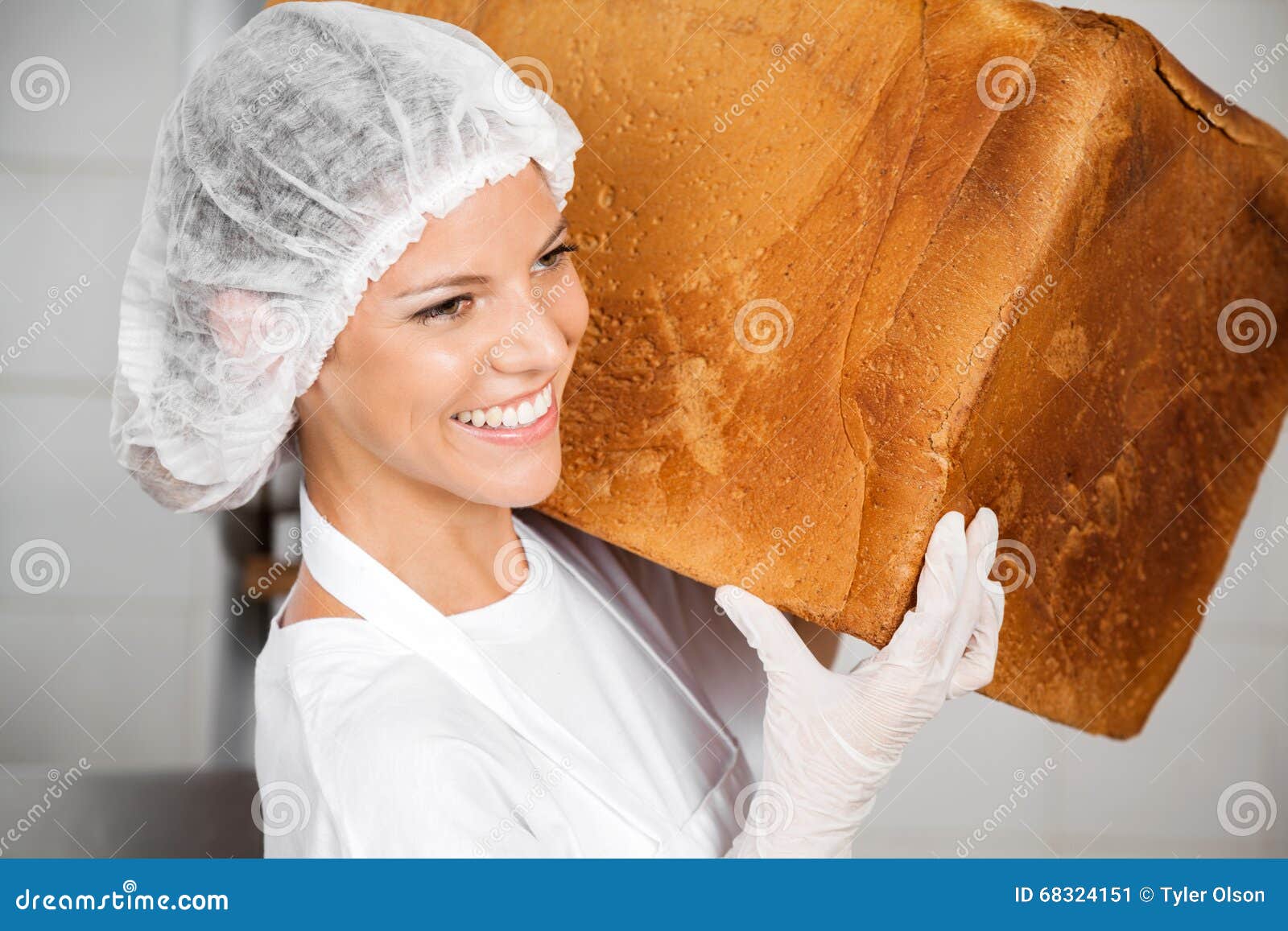 Closeup of Baker Smiling while Carrying Big Bread Loaf Stock Image ...