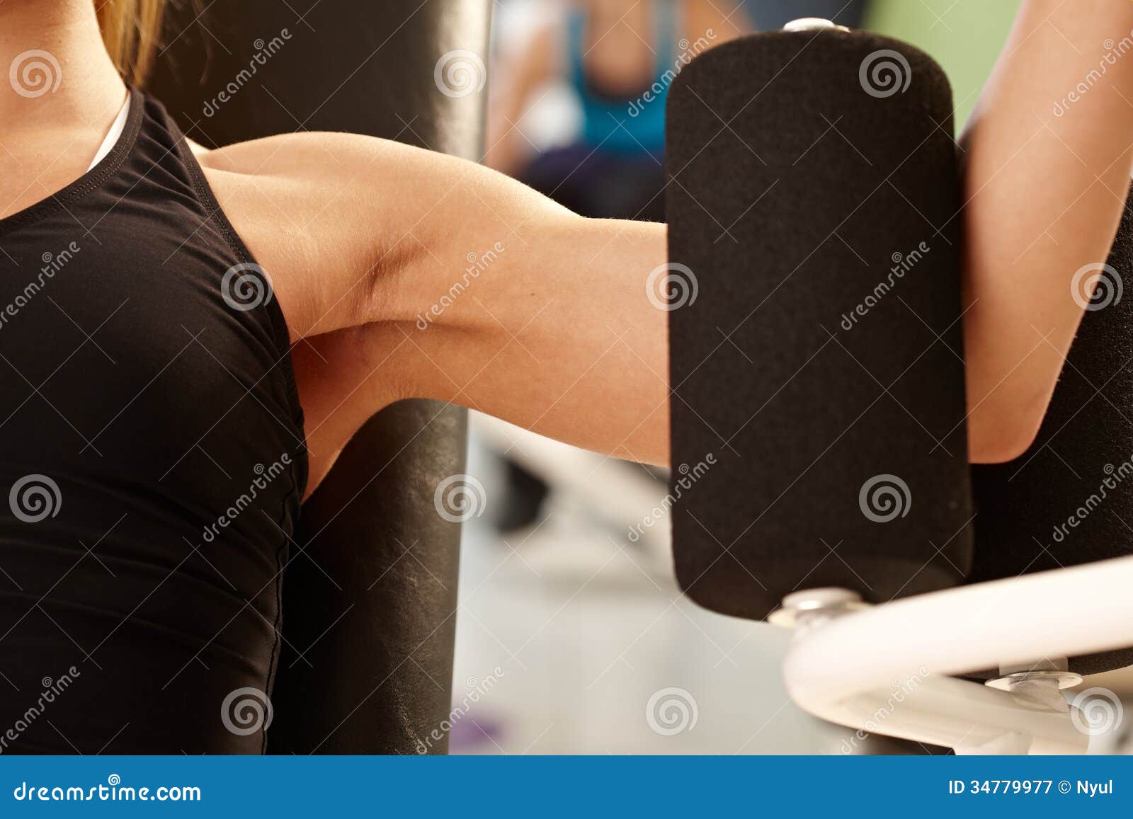 Female Biceps Exercise Using Rubber Resistance Band Royalty-Free Stock ...