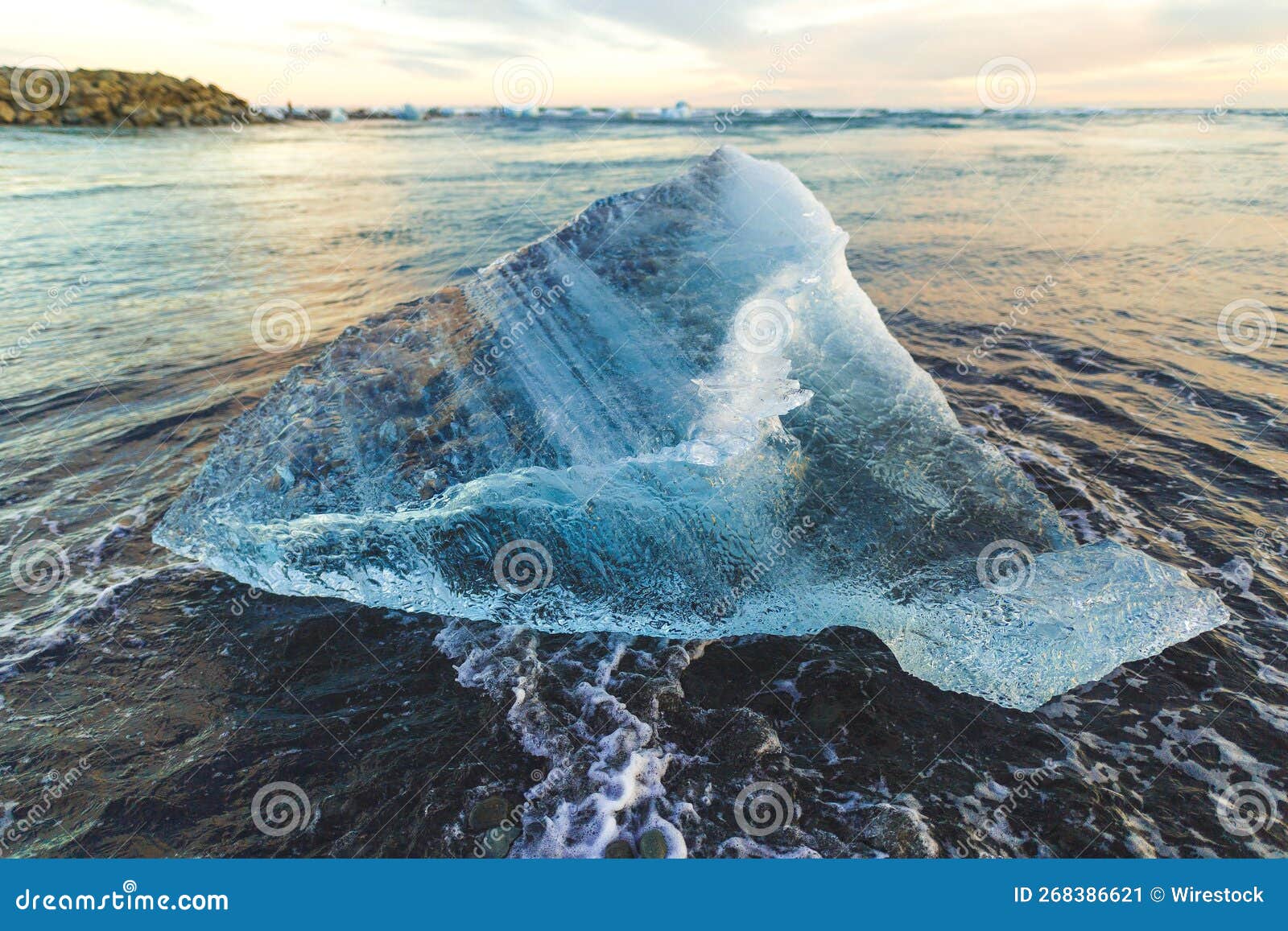 Closeup of a Big Ice on the Water with Sunset in the Background Stock ...