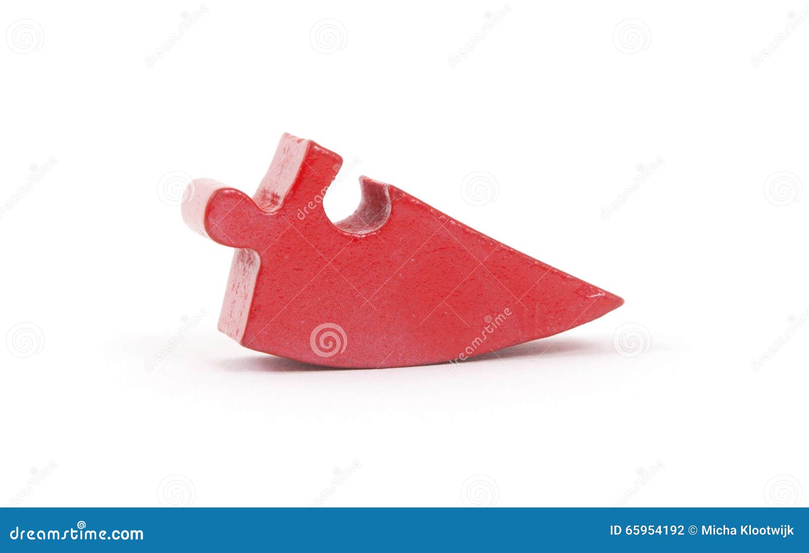 Closeup of Big Red Jigsaw Puzzle Piece Stock Photo - Image of wood ...