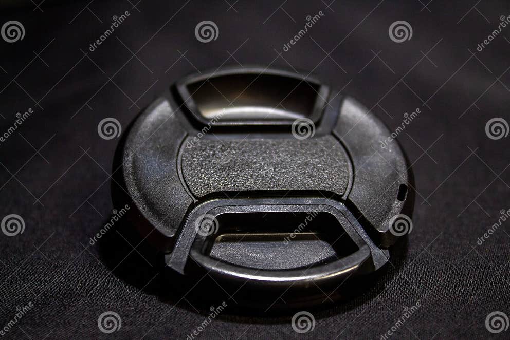 Closeup of a Black Cap of the Camera Lens Under the Light Stock Photo ...