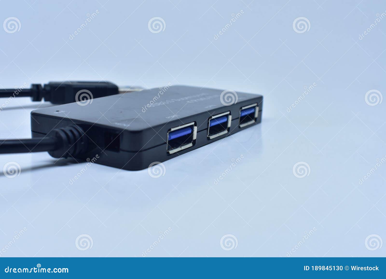 Closeup of a Black Portable USB Hub with a Wire Isolated on White ...