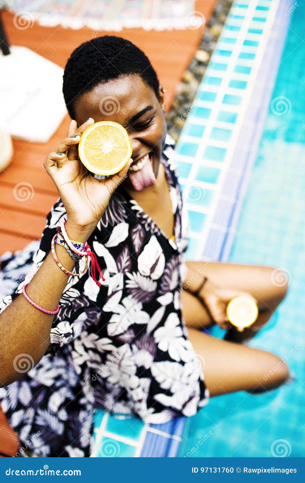 Closeup of Black Woman Sitting by the Pool Stock Photo - Image of ...