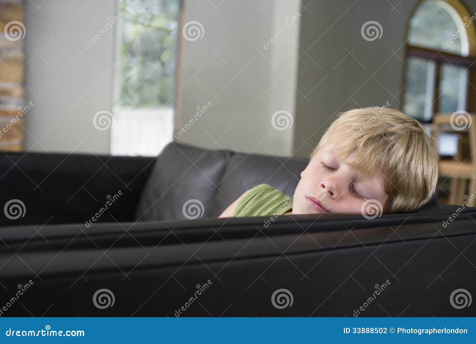 Closeup of Blond Boy Sleeping on Sofa Stock Photo - Image of relaxation ...