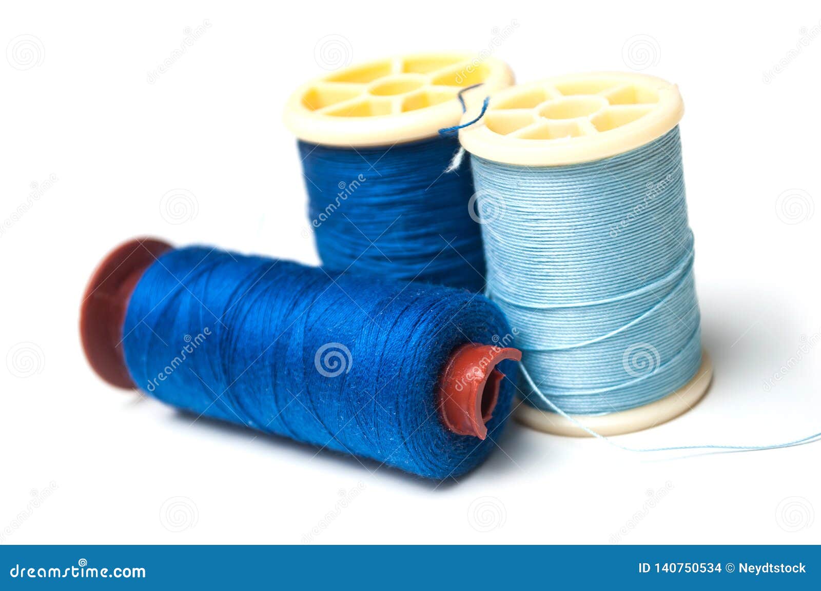 Blue Sewing Thread Spool Bobbins on White Background Stock Photo ...