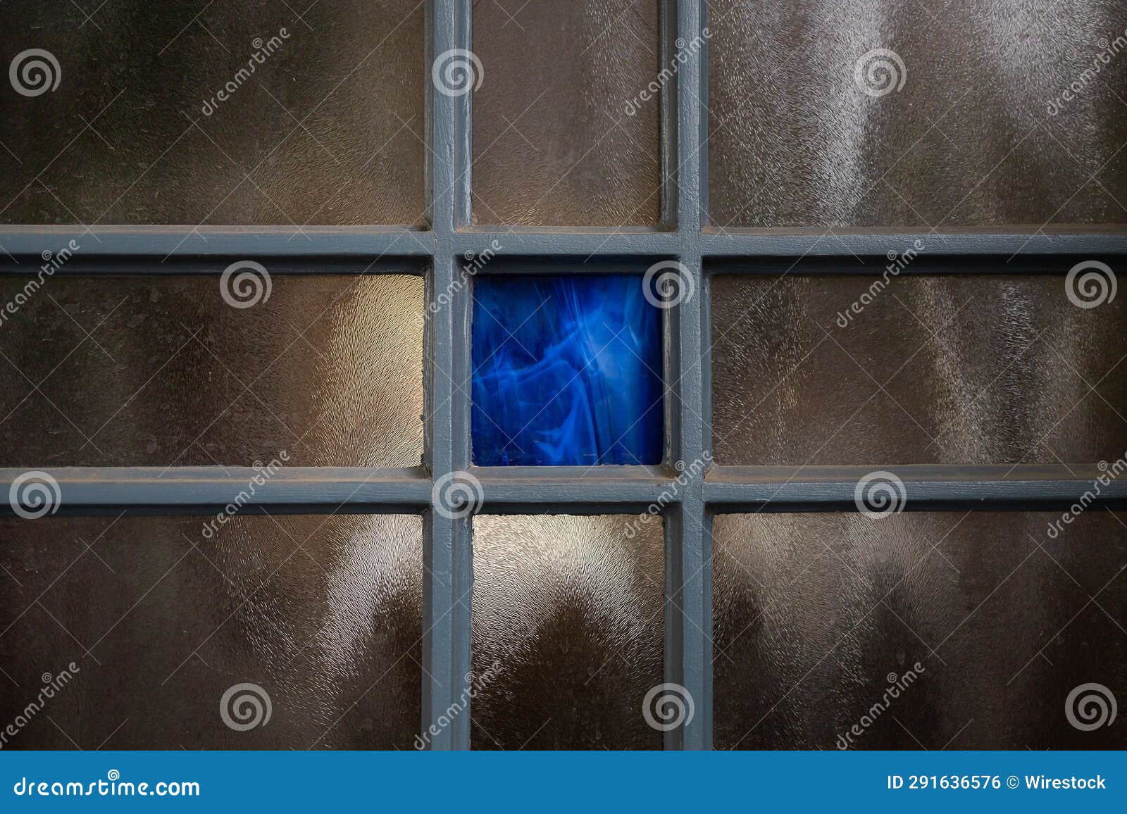 Closeup of a Blue Square Glass Panel Embedded in a Door, Creating an ...