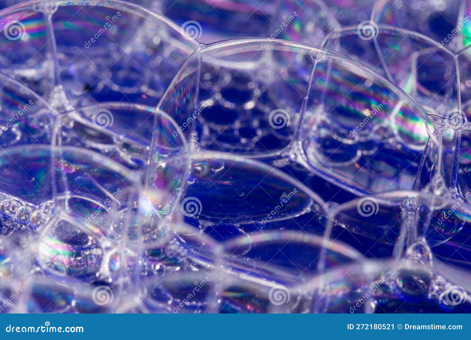 Closeup of Blue Translucent Soap Bubbles Floating on the Water Surface ...