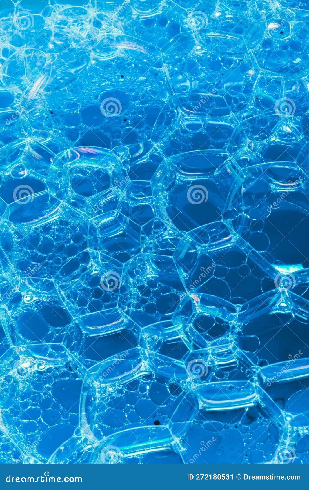 Closeup of Blue Translucent Soap Bubbles Floating on the Water Surface ...