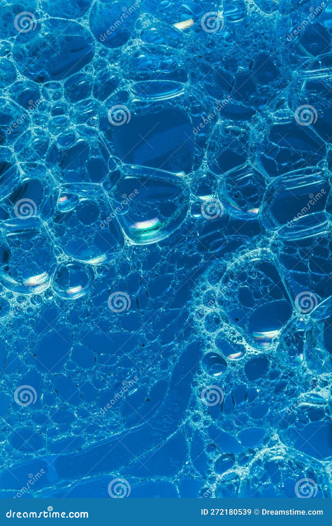 Closeup of Blue Translucent Soap Bubbles Floating on the Water Surface ...