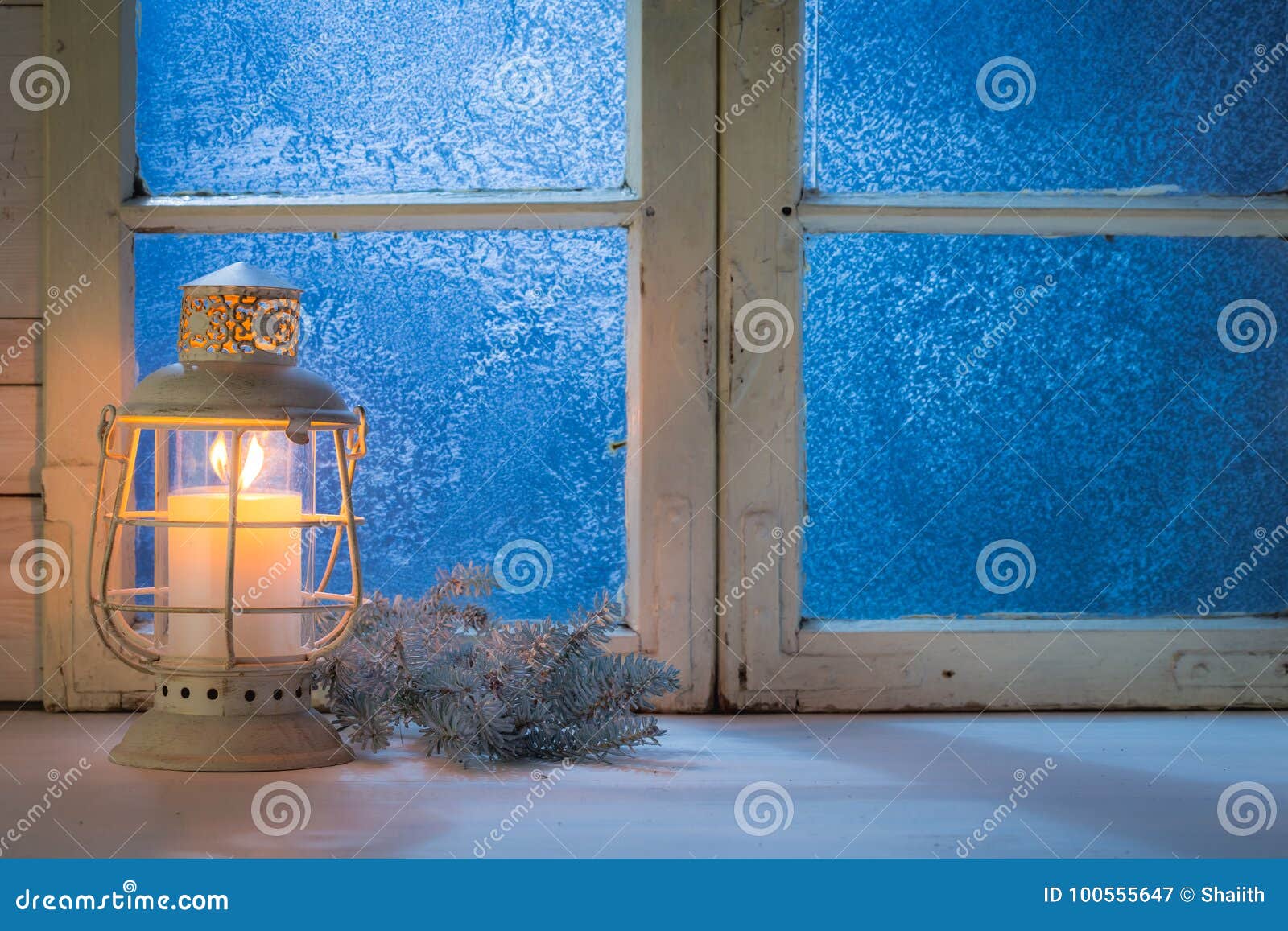 Blue Window at Night with Burning Candle for Christmas Stock Image ...
