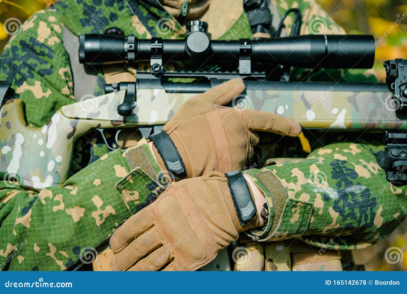 Closeup Body of Man in Uniform with Sniper Rifle. Side View Stock Photo ...
