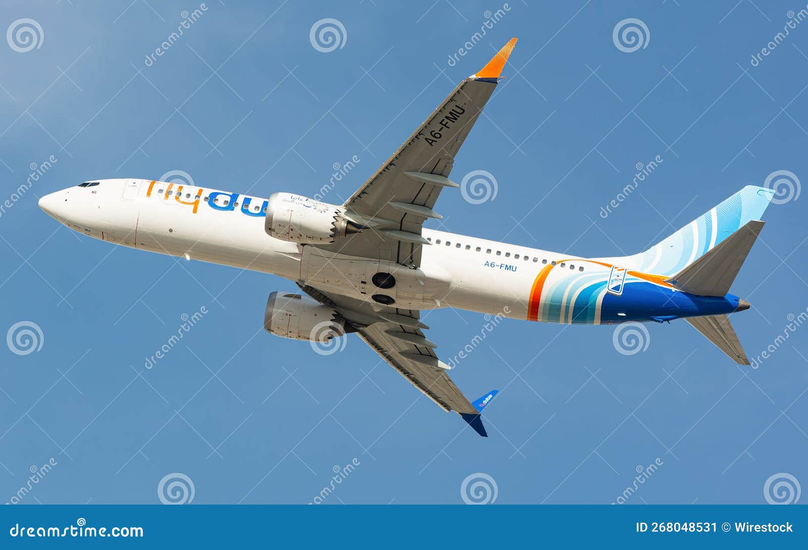 Closeup of the Boeing 737 of Flydubai on a Clear Blue Sky Background ...