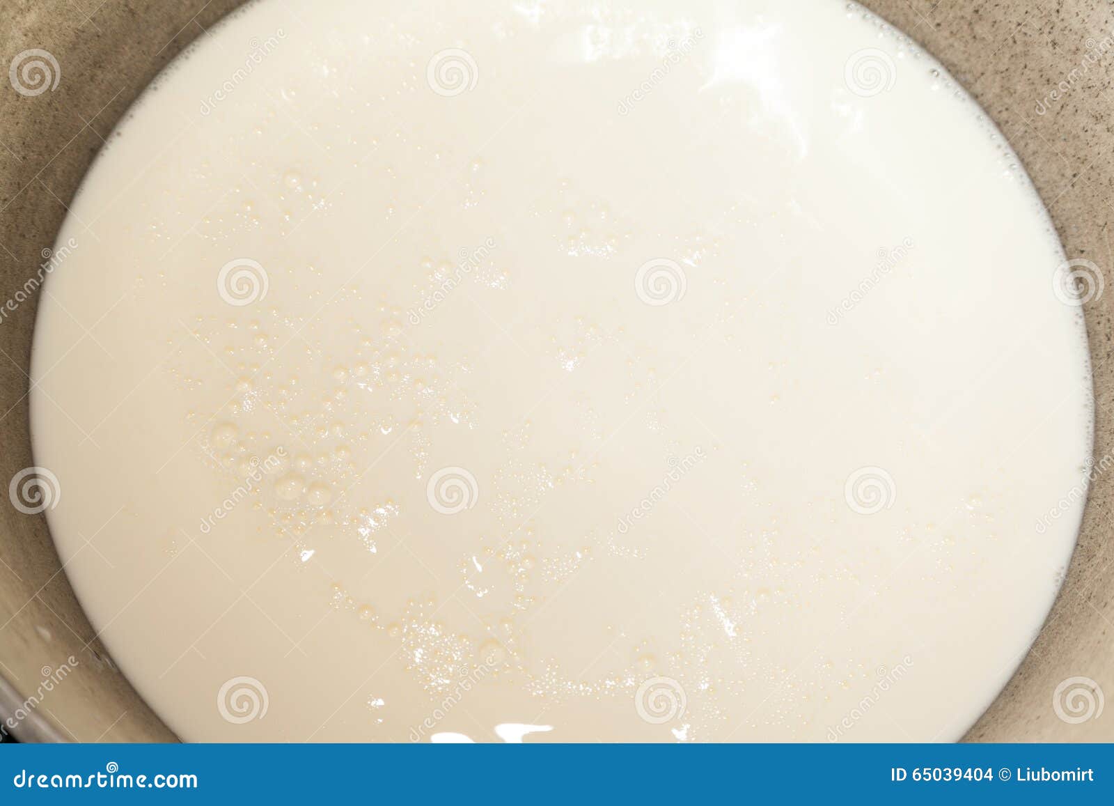 Closeup of boiling milk stock photo. Image of iron, cauldron - 65039404