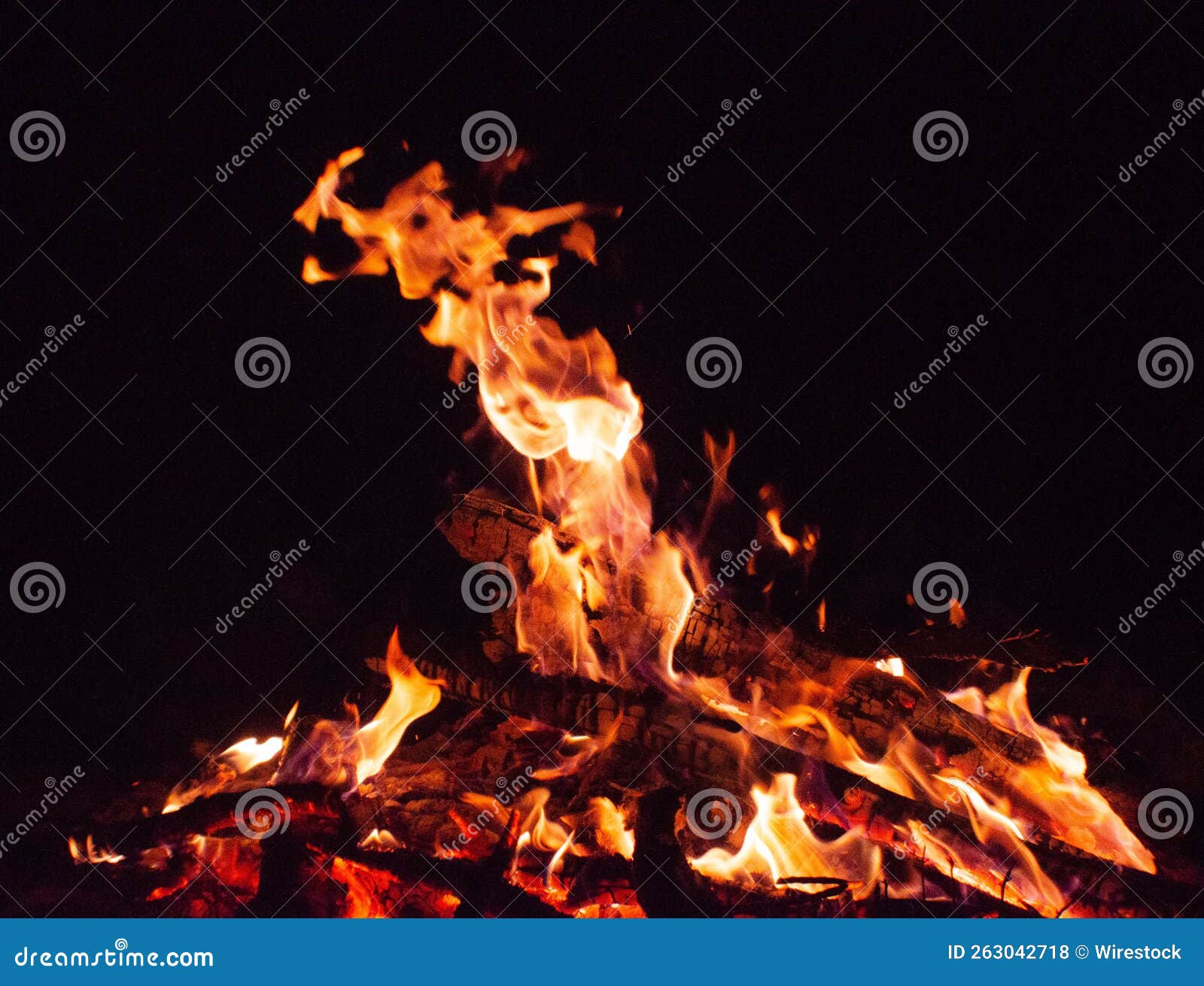 Closeup of a Bonfire with Orange Fire Flakes Isolated on a Black ...