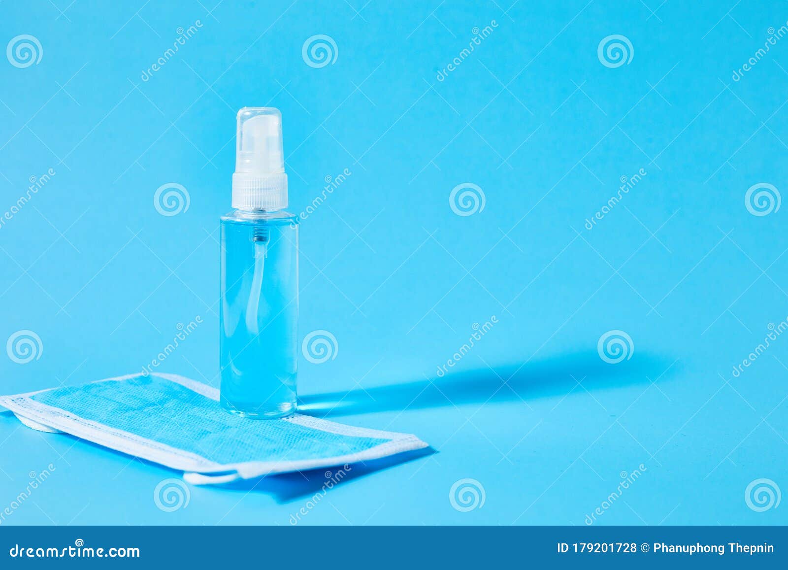 Closeup Bottle of Blue Alcohol Hand Spray Stock Photo - Image of liquid ...