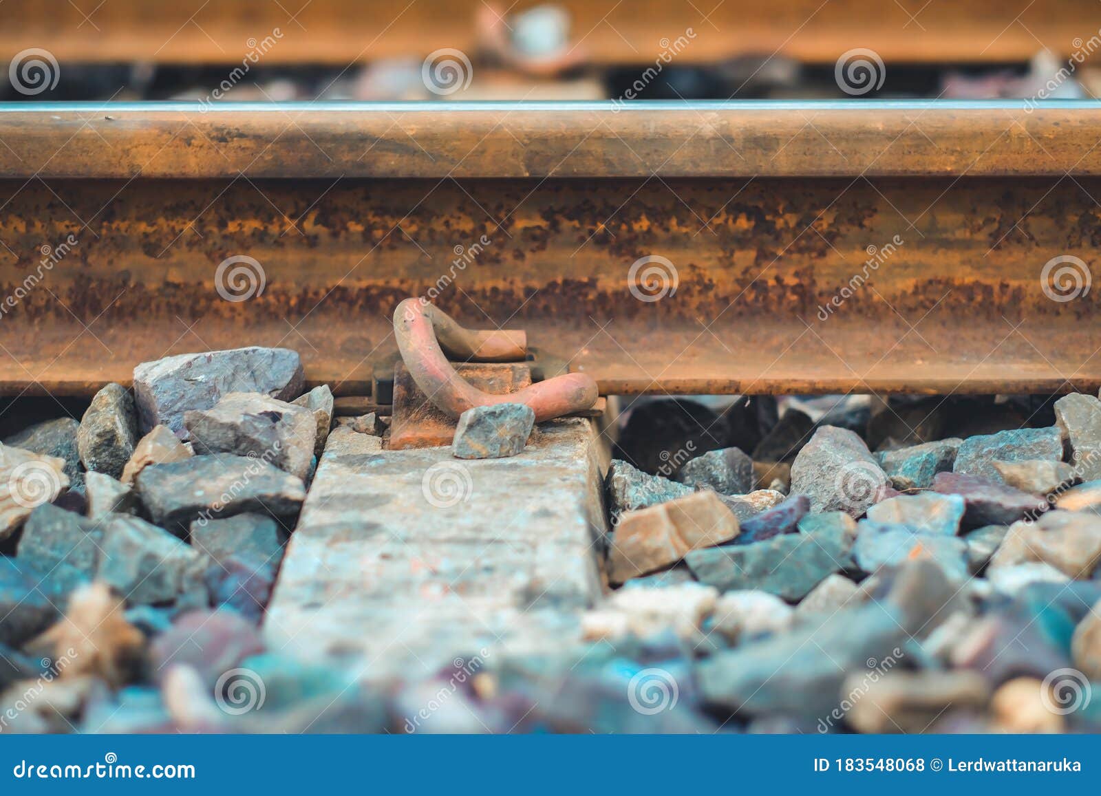 Closeup Bracket for Railway Tracks with Concrete Sleepers and Rubble ...