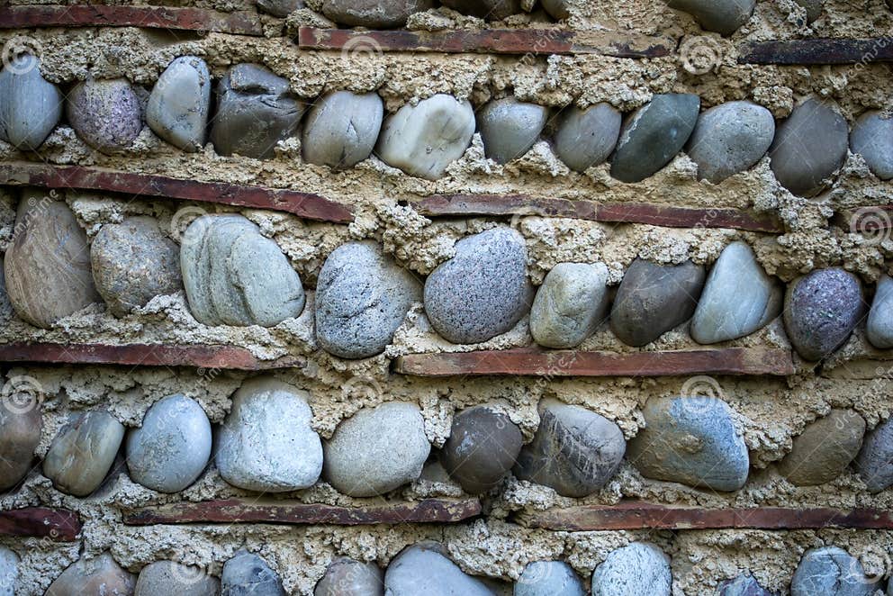 Bricks and Pebbles on Wall Texture Stock Photo - Image of beautiful, wall: 280925414