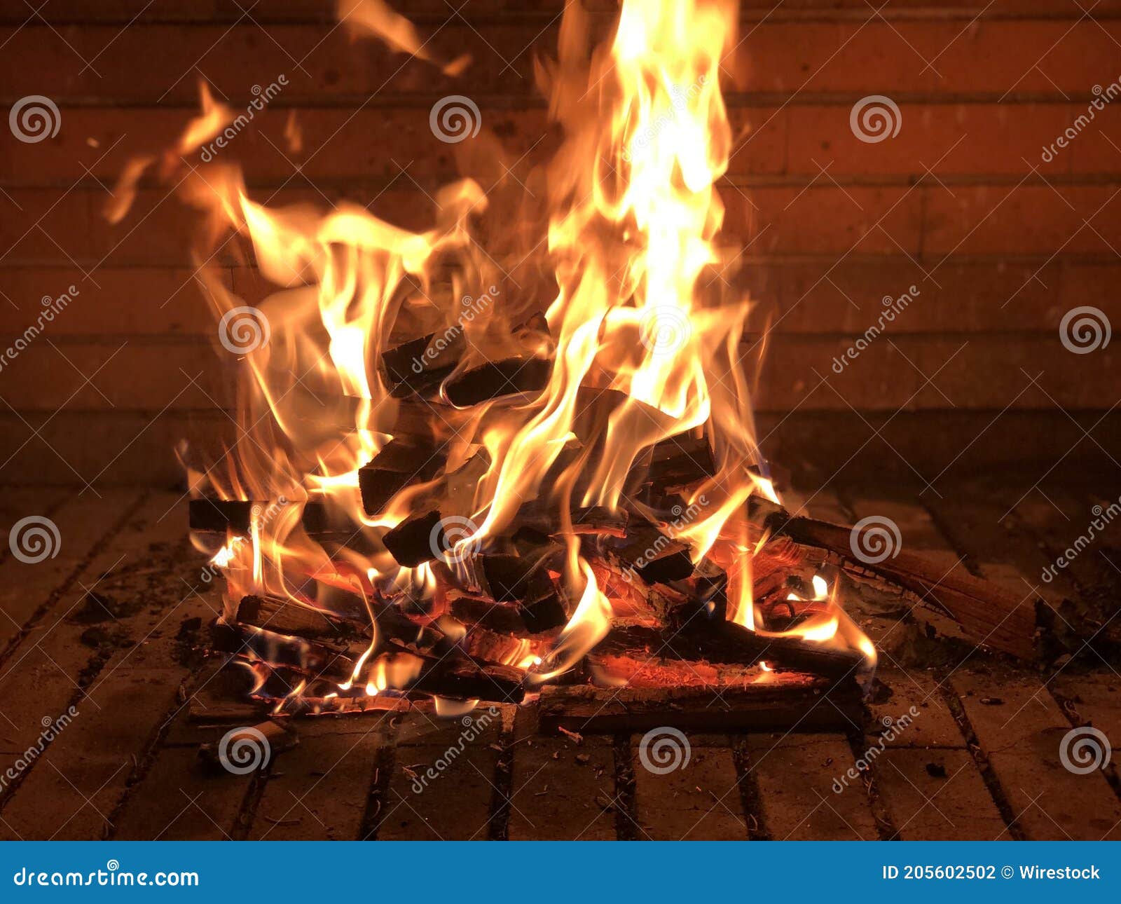 Closeup of a Bright Campfire on a Brick Surface Stock Photo - Image of ...