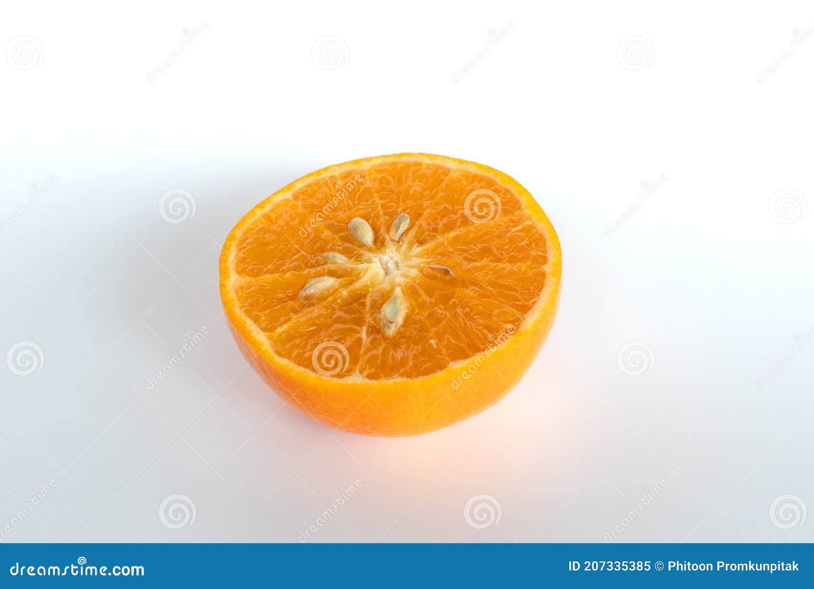 Closeup, Bright Orange Remaining Orange Cut in Half on a White ...