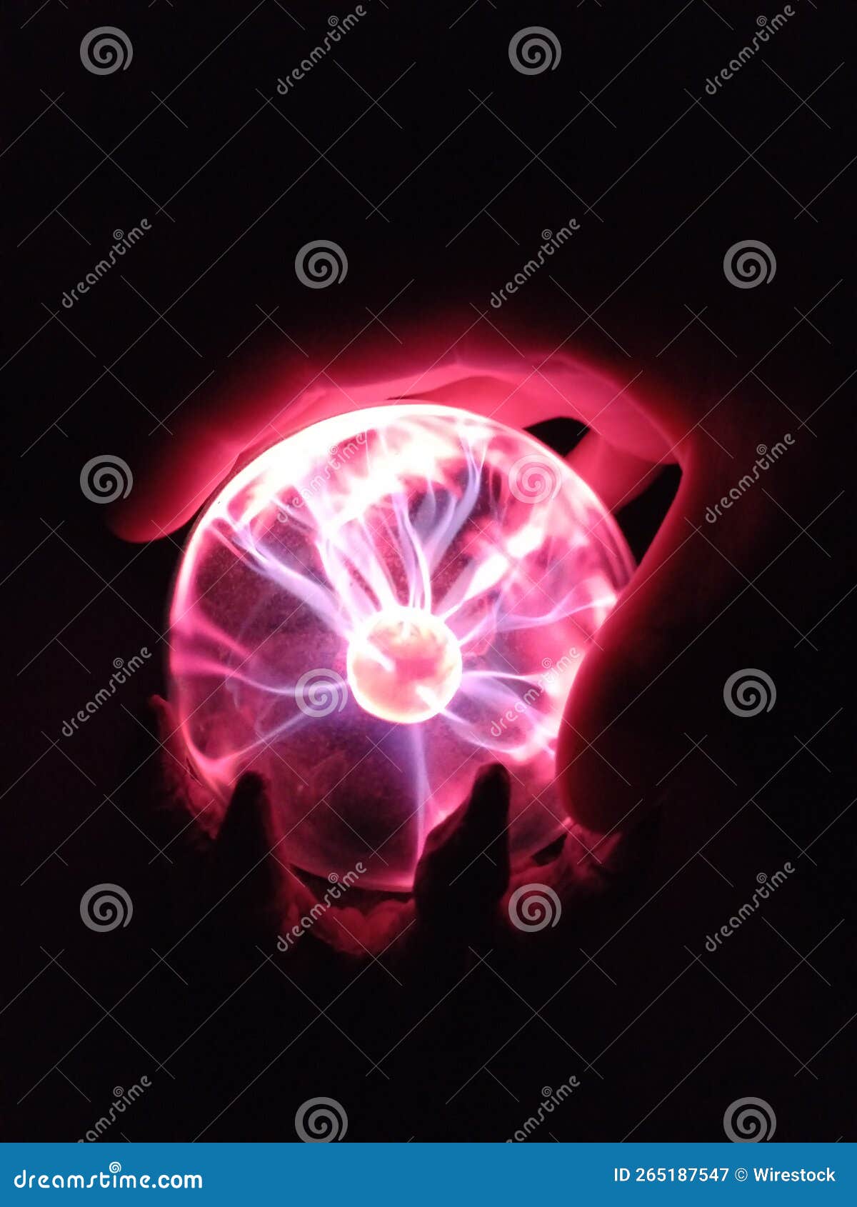 Closeup of a Bright Plasma Globe with a Hand Touching it. Stock Image ...