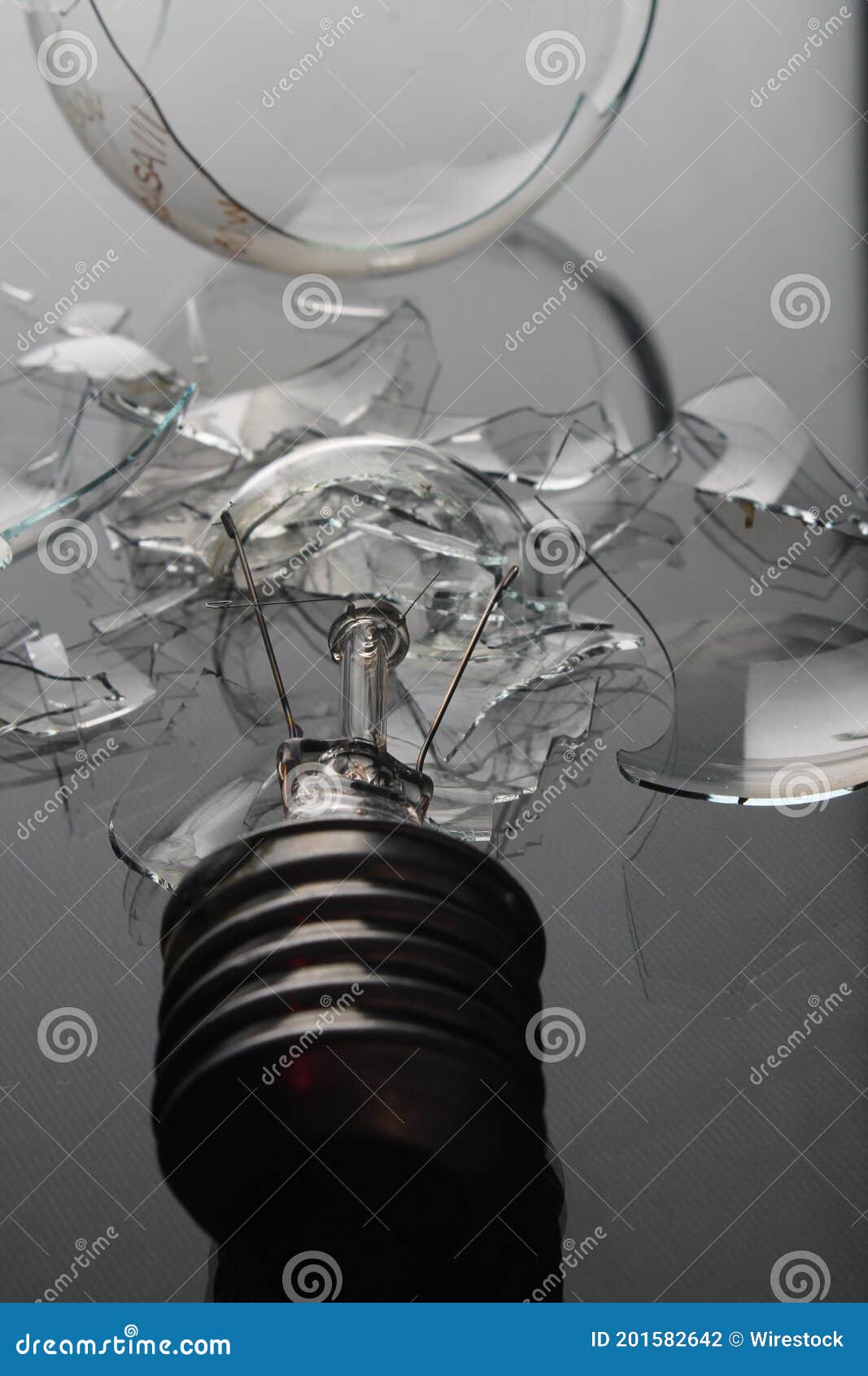 Closeup of a Broken Light Bulb on the Smooth Surface Stock Photo ...