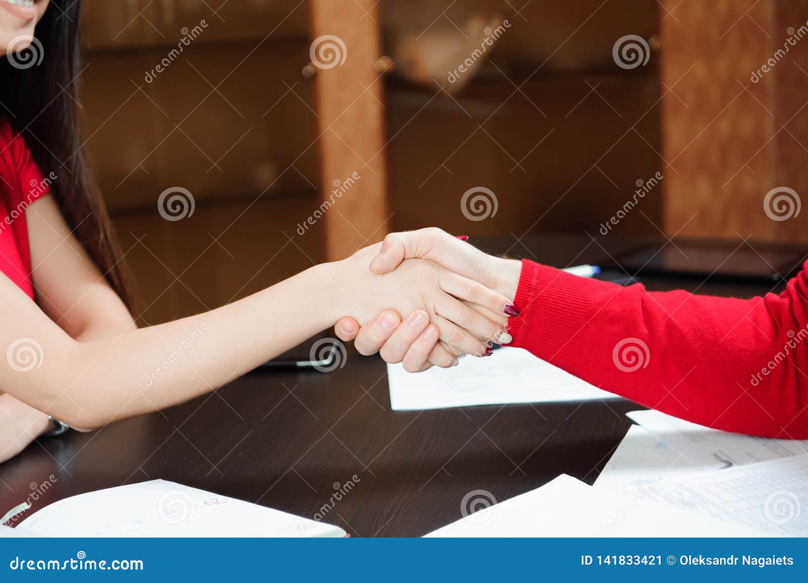 Closeup of a Business Handshake Business Coach Holding Training for ...