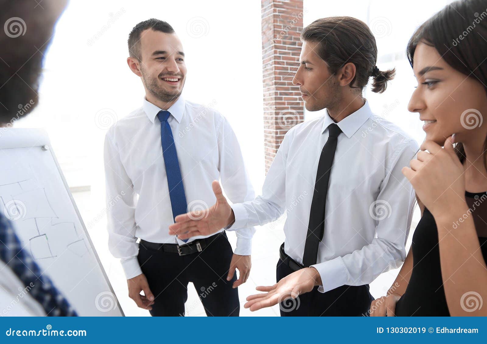Closeup of a Business Team Discussing the Current Issues Stock Image ...