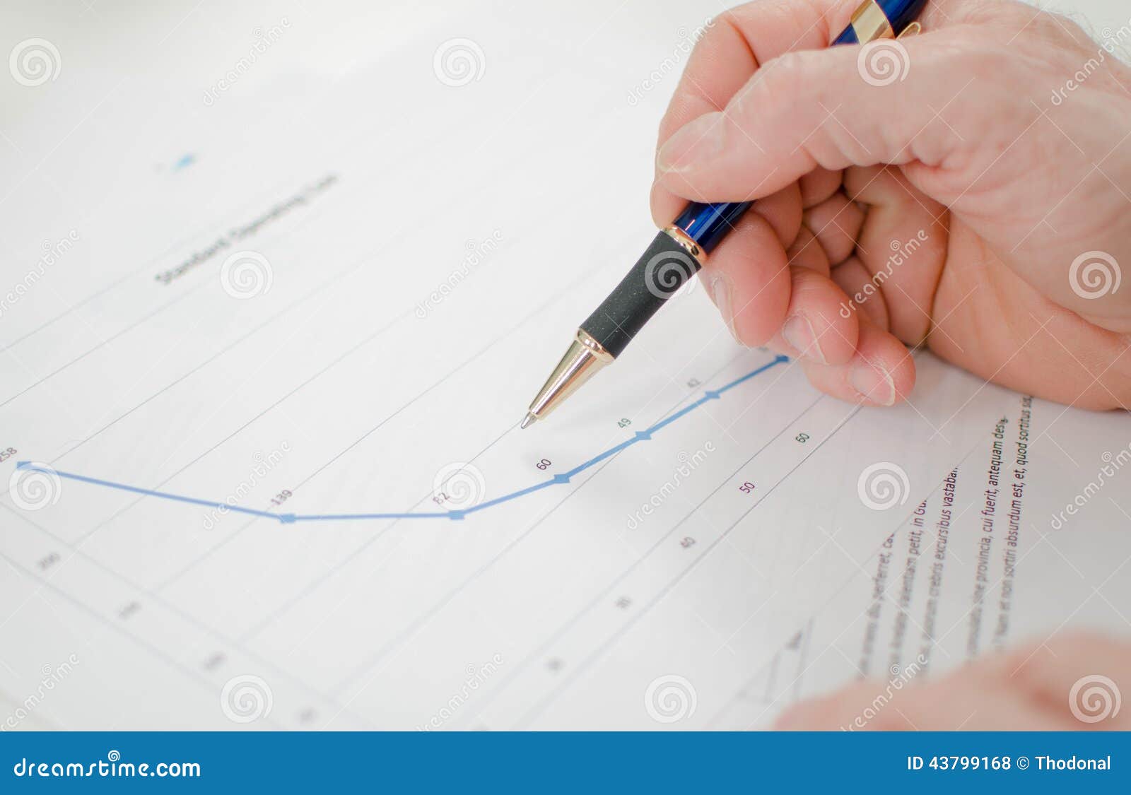 Closeup of Businessman Looking at a Graph Stock Photo - Image of person ...