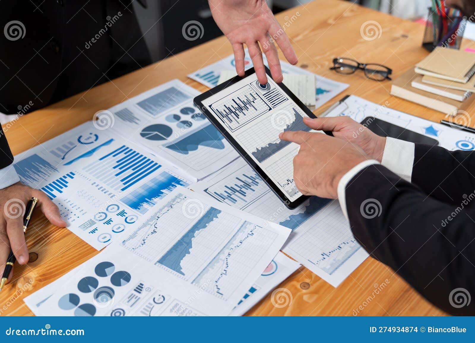 Closeup Busy Analyst Team Discussing Financial Data on Laptop. Fervent ...