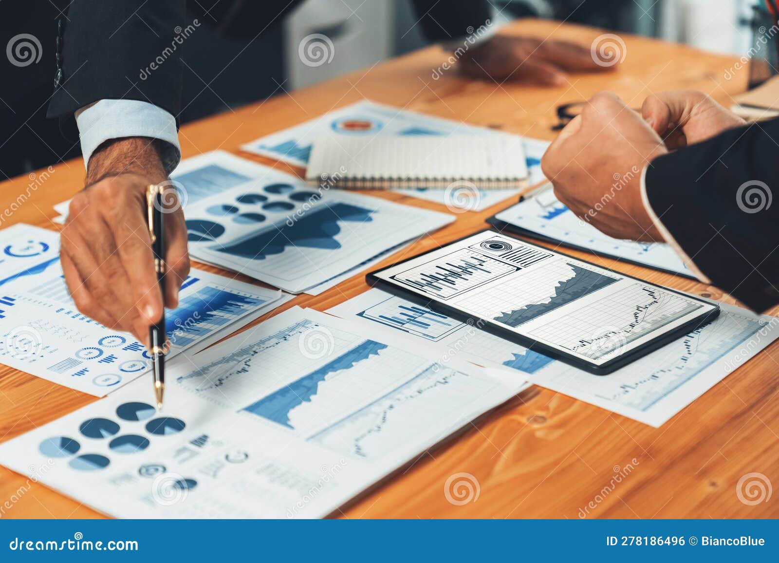 Closeup Busy Analyst Team Discussing Financial Data on Laptop. Fervent ...