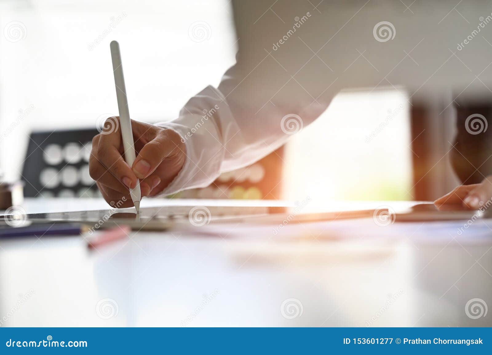 Closeup and Candid Photo of Hands Using Digital Pen on Digital Tablet ...