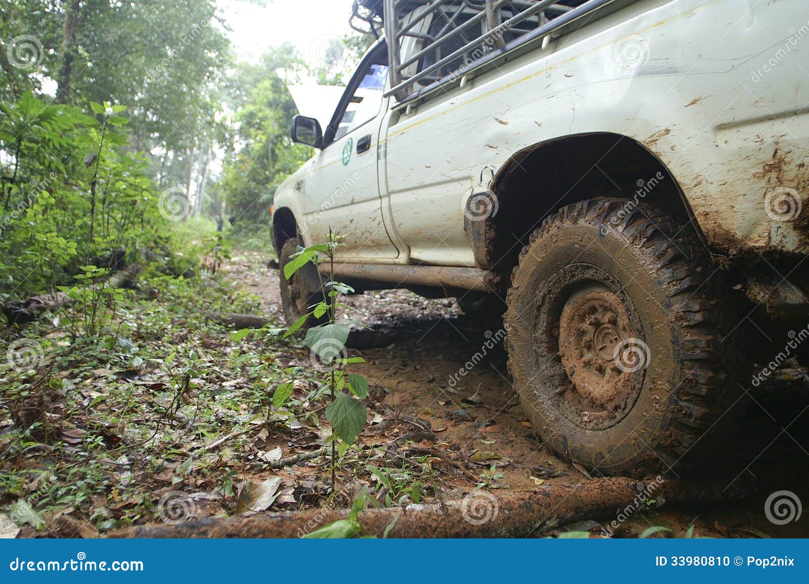 Closeup of 4x4 Car Driving Uphill with Mud Stock Photo - Image of ...